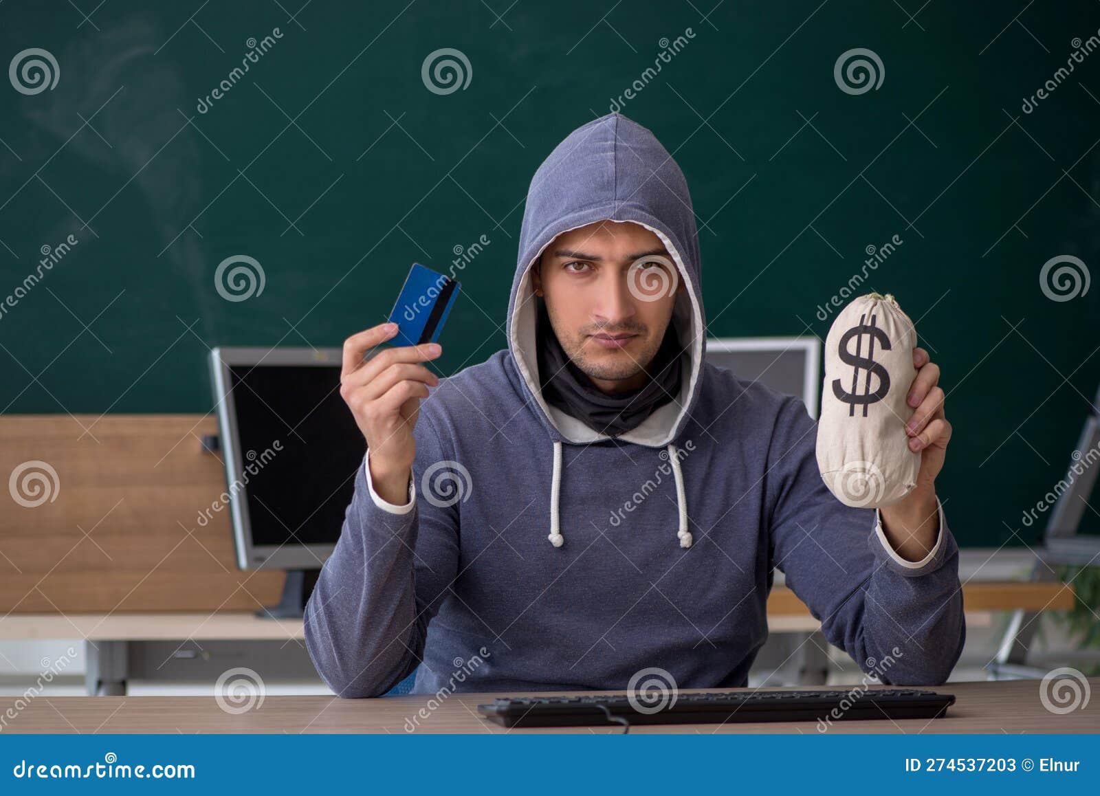 Young Male Hacker Sitting in the Classroom Stock Image - Image of ...