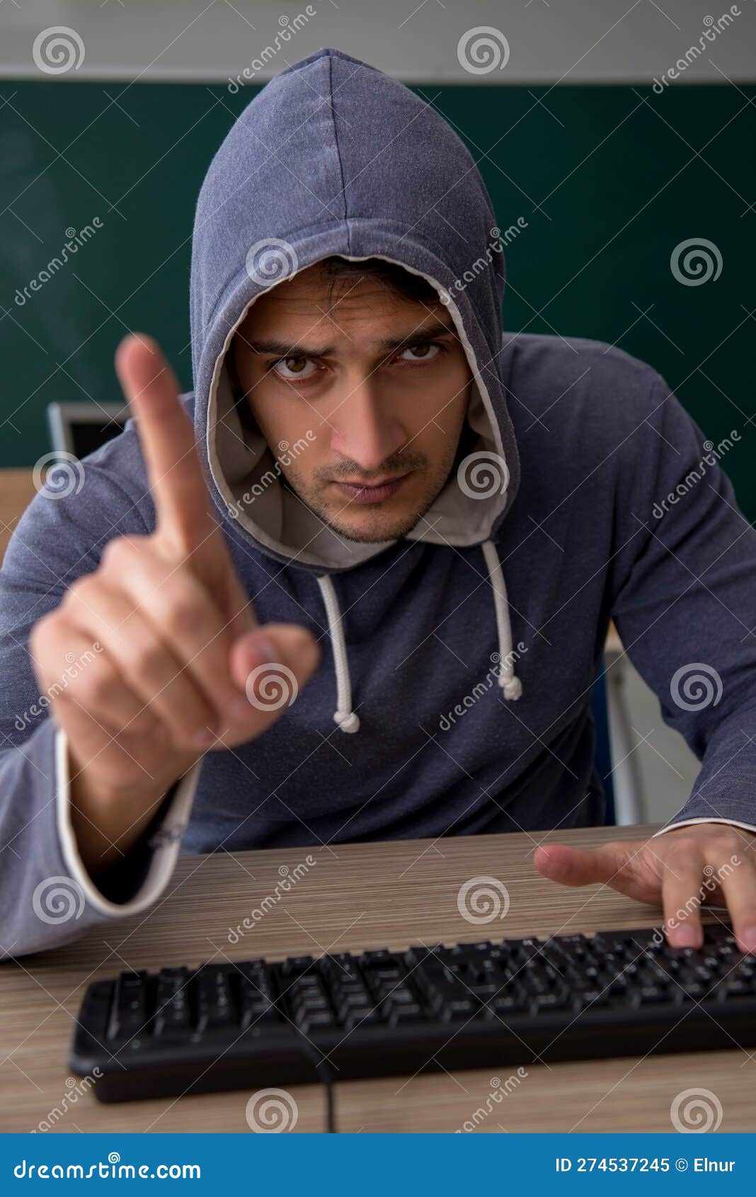 Young Male Hacker Sitting in the Classroom Stock Image - Image of ...