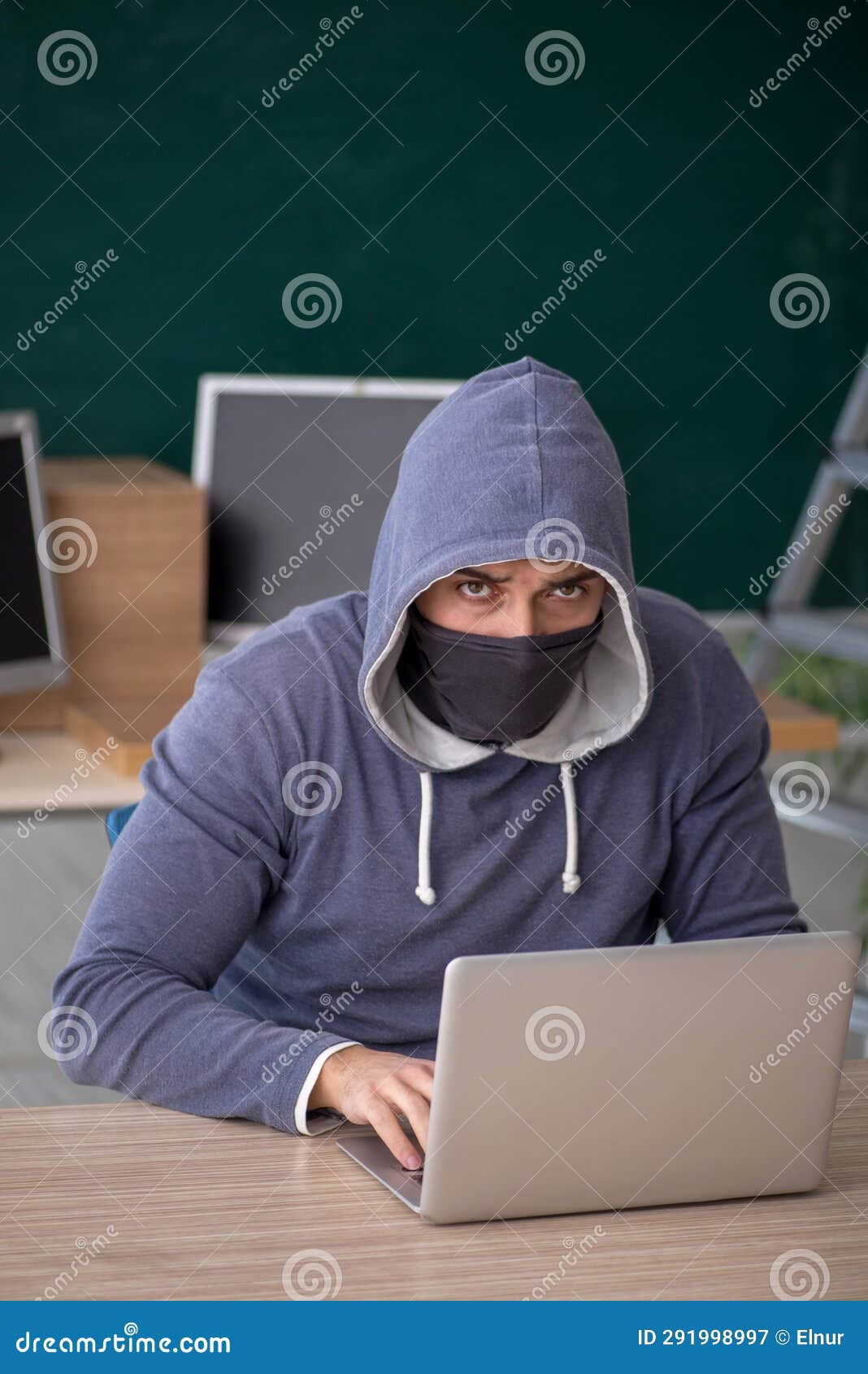 Young Male Hacker Sitting in the Classroom Stock Image - Image of ...