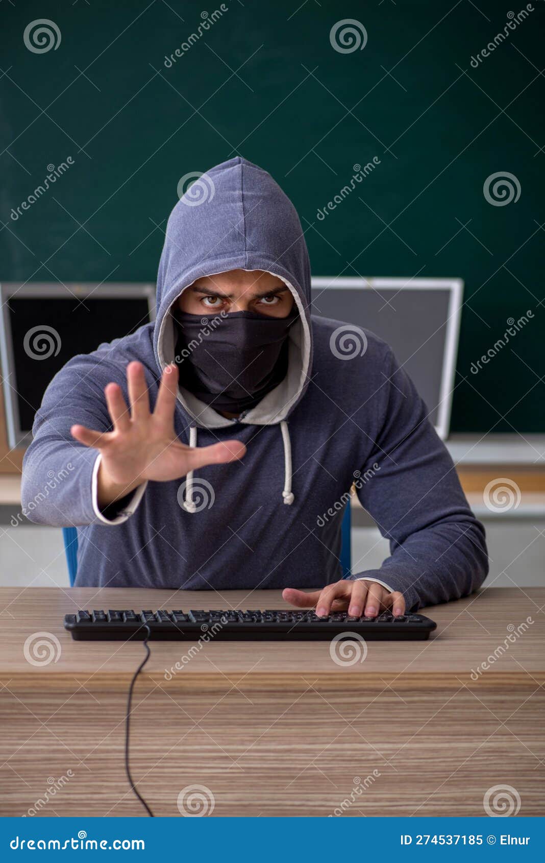 Young Male Hacker Sitting in the Classroom Stock Image - Image of ...