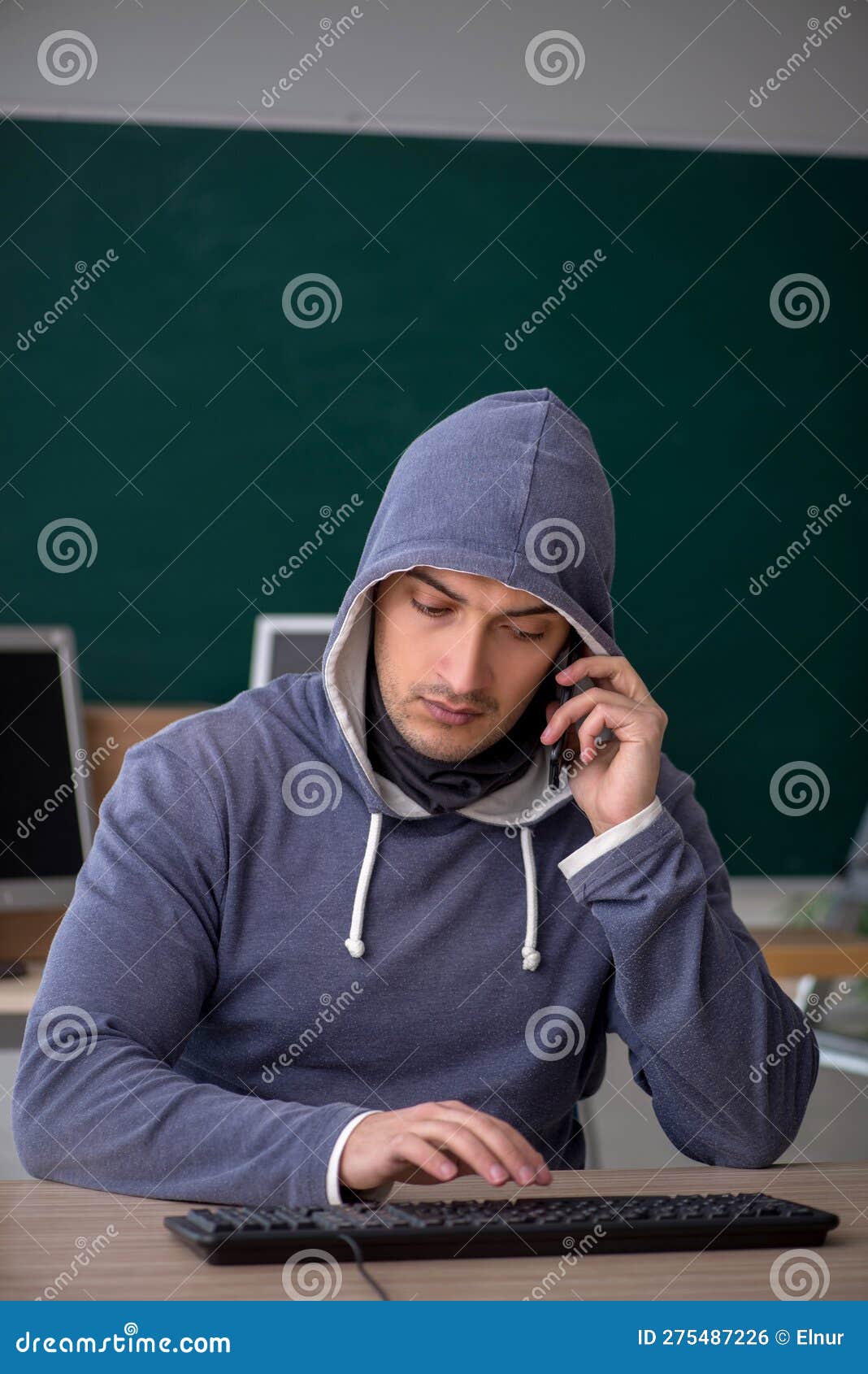 Young Male Hacker Sitting in the Classroom Stock Photo - Image of ...