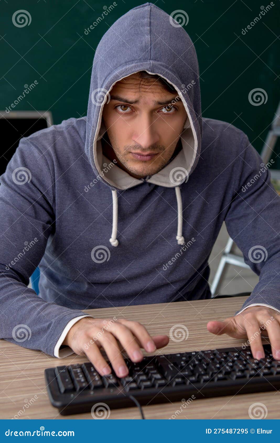 Young Male Hacker Sitting in the Classroom Stock Image - Image of ...