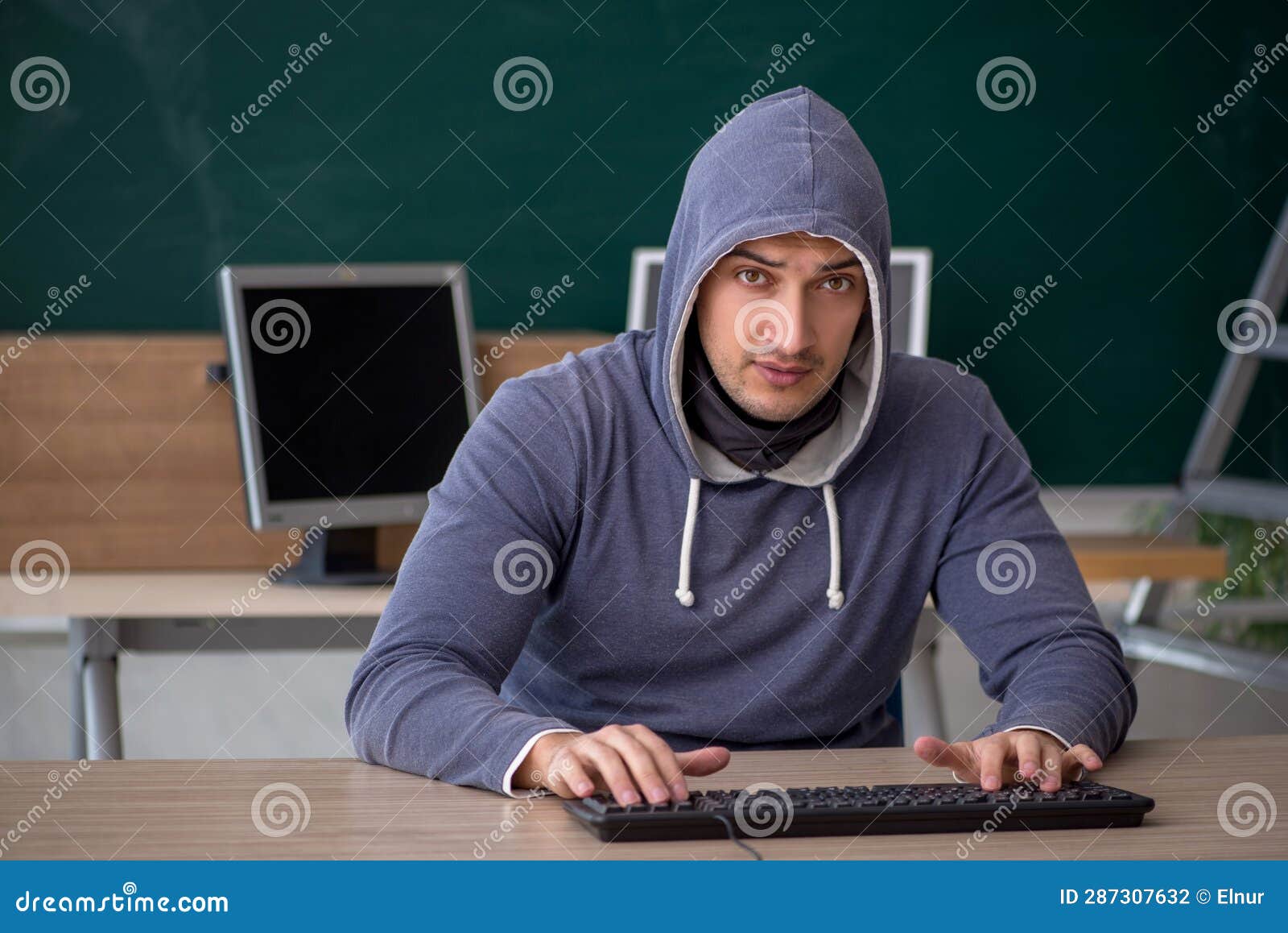 Young Male Hacker Sitting in the Classroom Stock Photo - Image of fraud ...