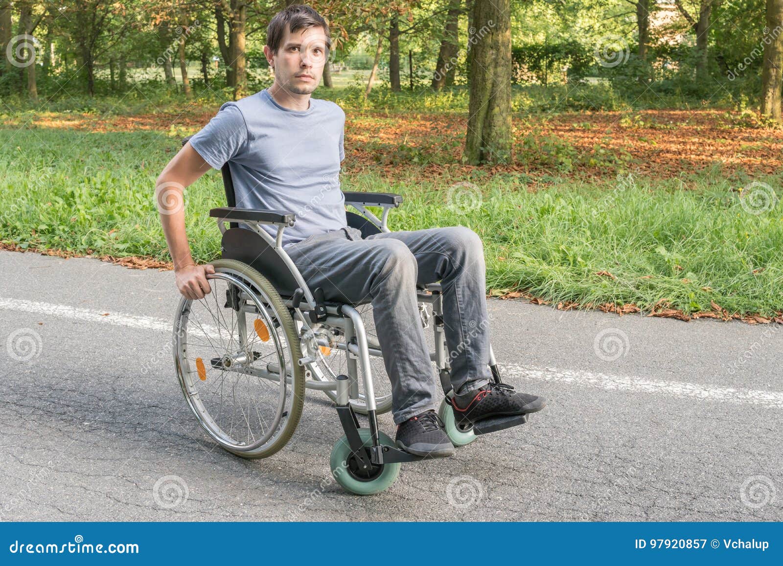 Young Handicapped or Disabled Man on Wheelchair Stock Image - Image of ...