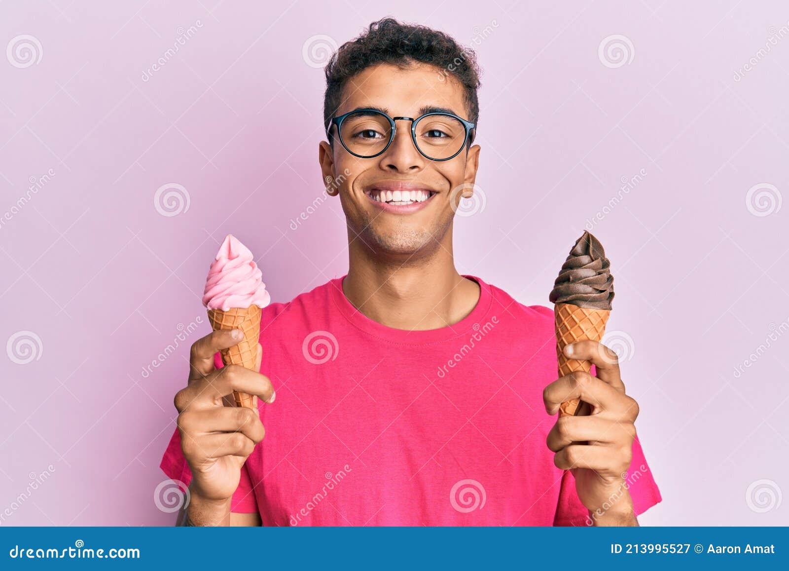 Young Handsome African American Man Holding Ice Cream Cones Smiling