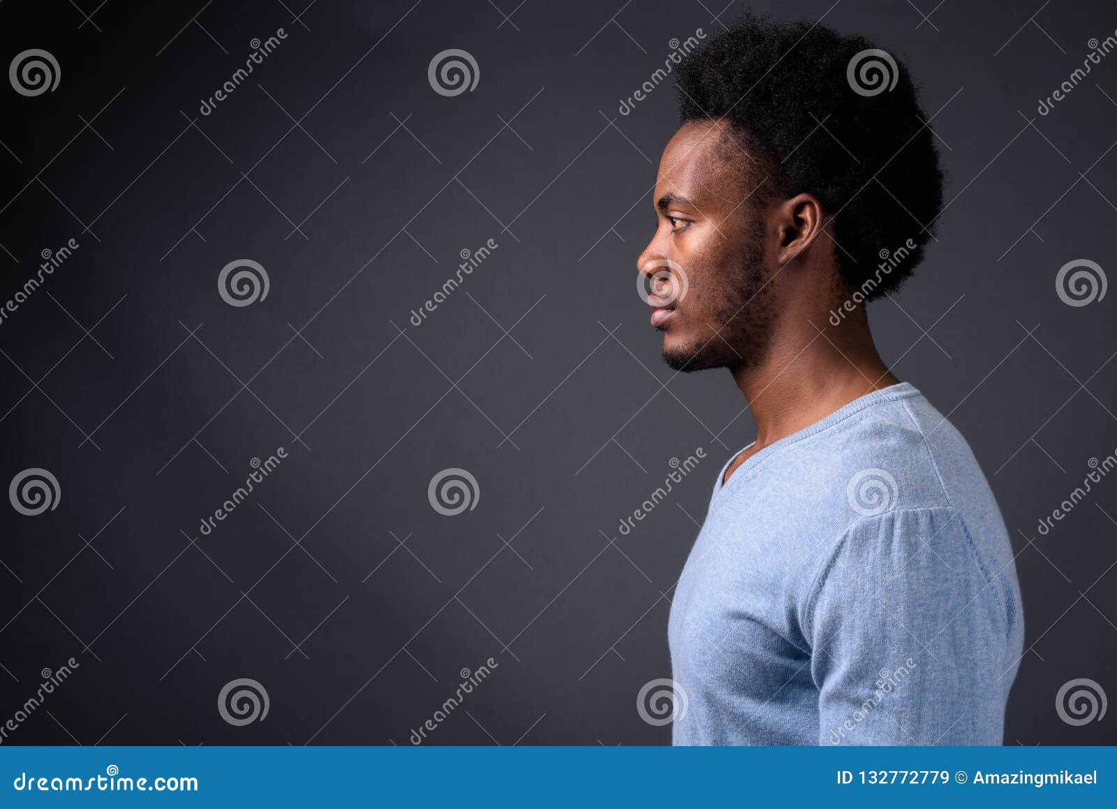 Young Handsome African Man Against Gray Background Stock Image - Image ...
