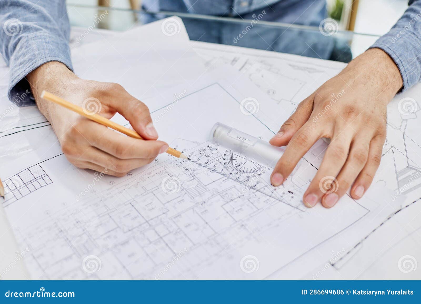 Young Handsome Architect Engineer Working on Design Plan Stock Photo ...
