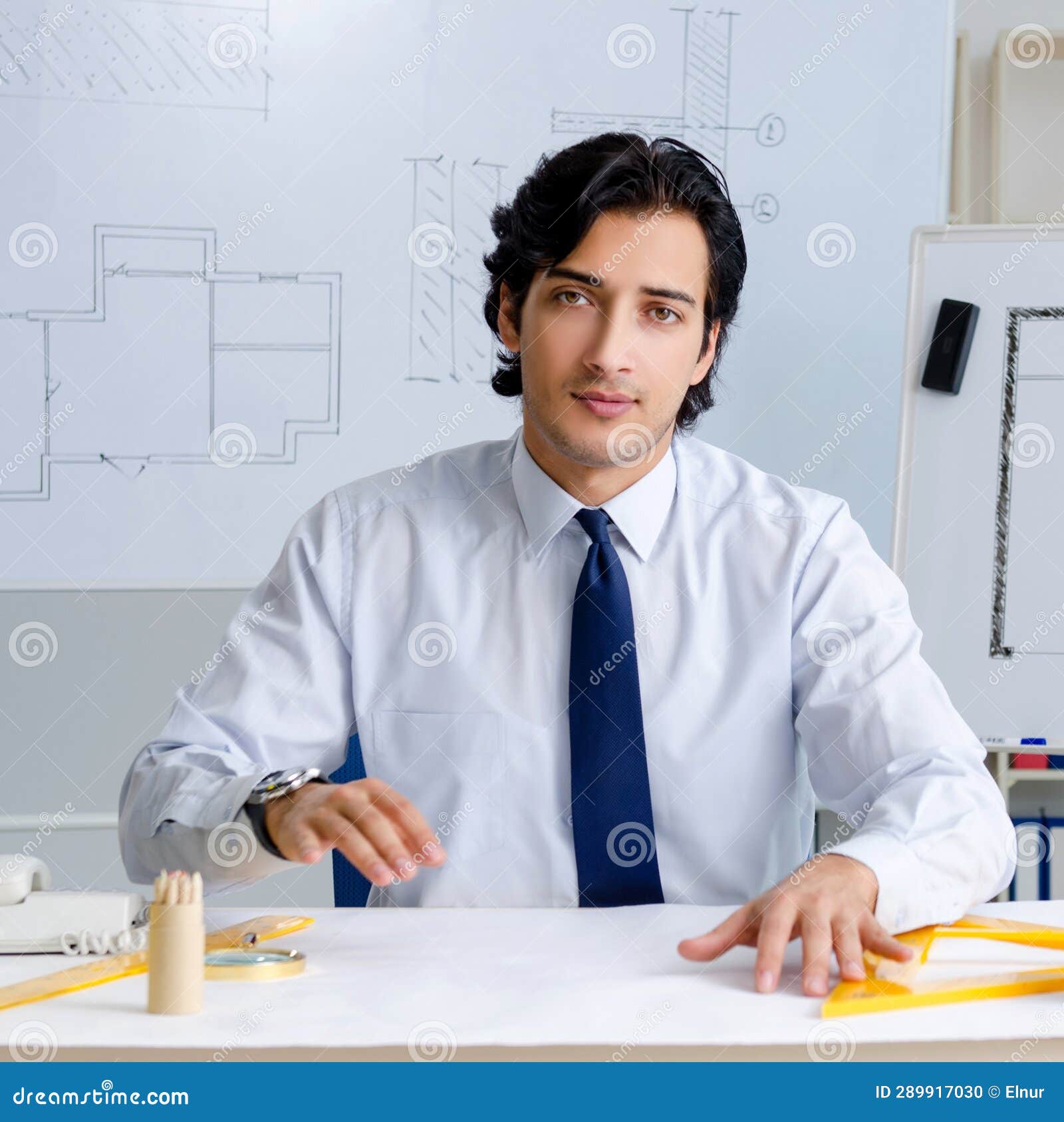 Young Handsome Architect Working on the Project Stock Photo - Image of ...