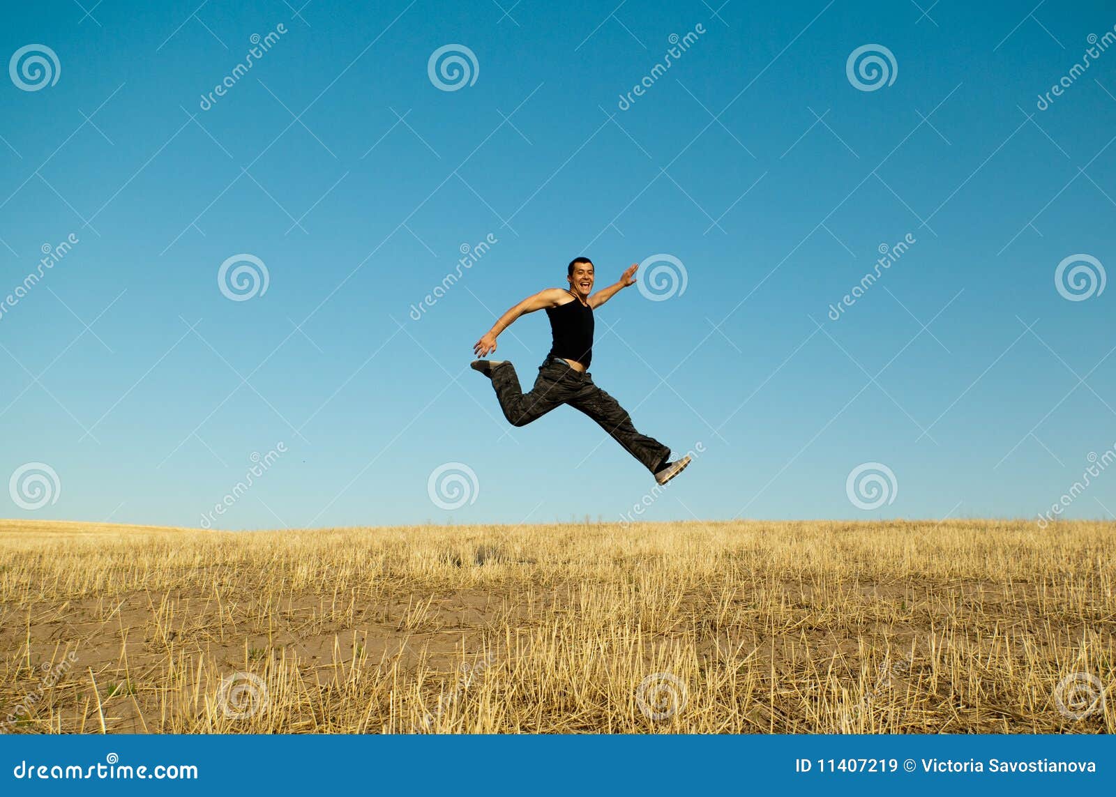 Young Handsome Asian Man Jumping Stock Image - Image of field, barley ...