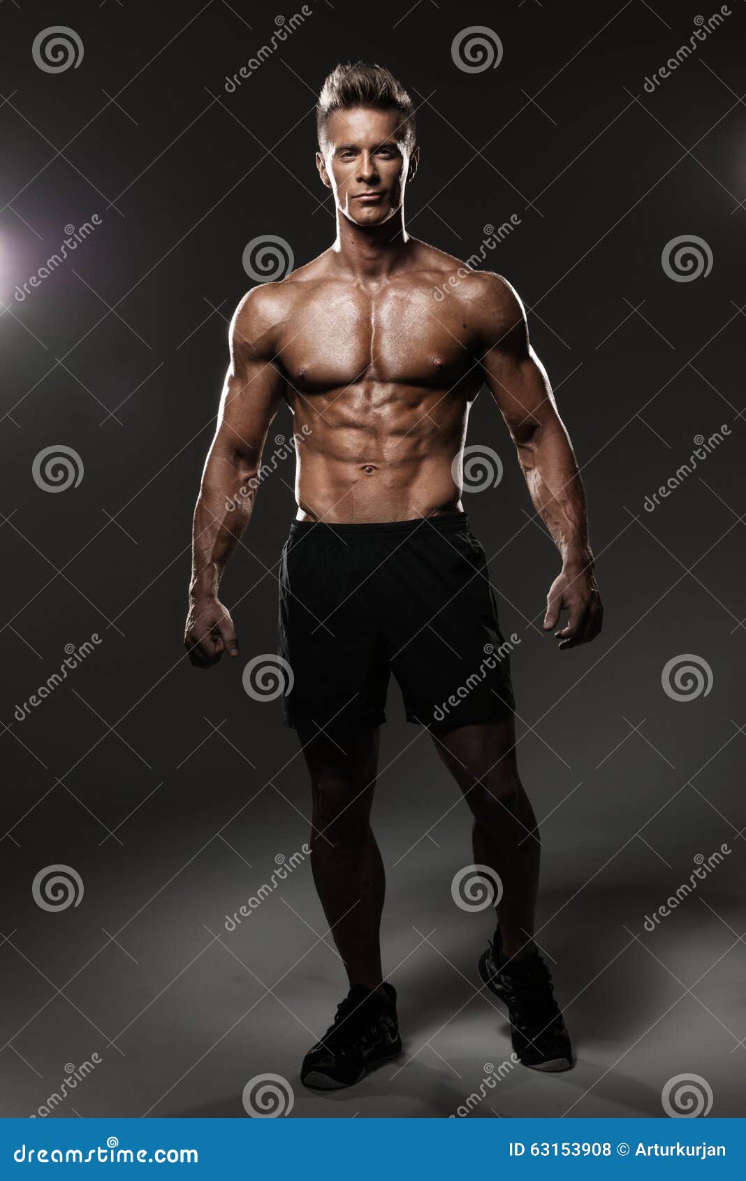 Young handsome athlete stock photo. Image of muscle, exercise - 63153908