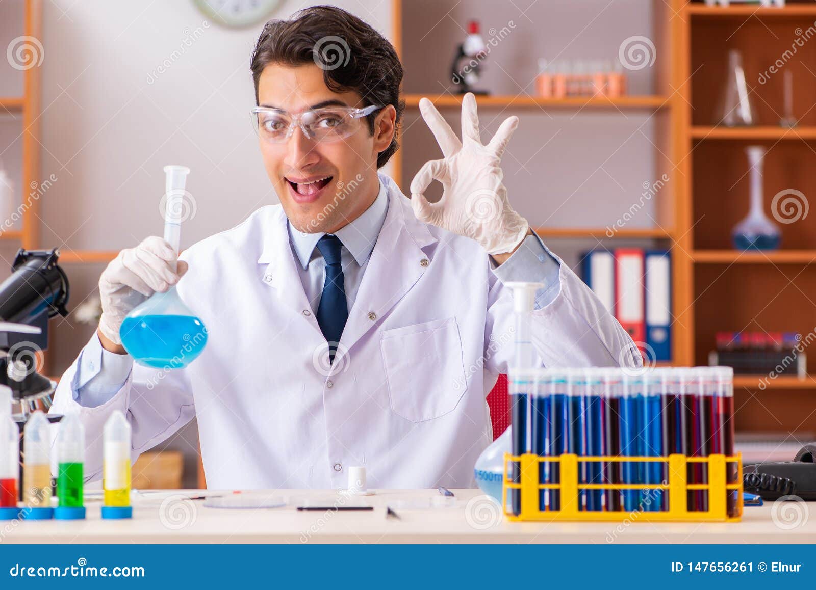 The Young Handsome Biochemist Working in the Lab Stock Image - Image of ...