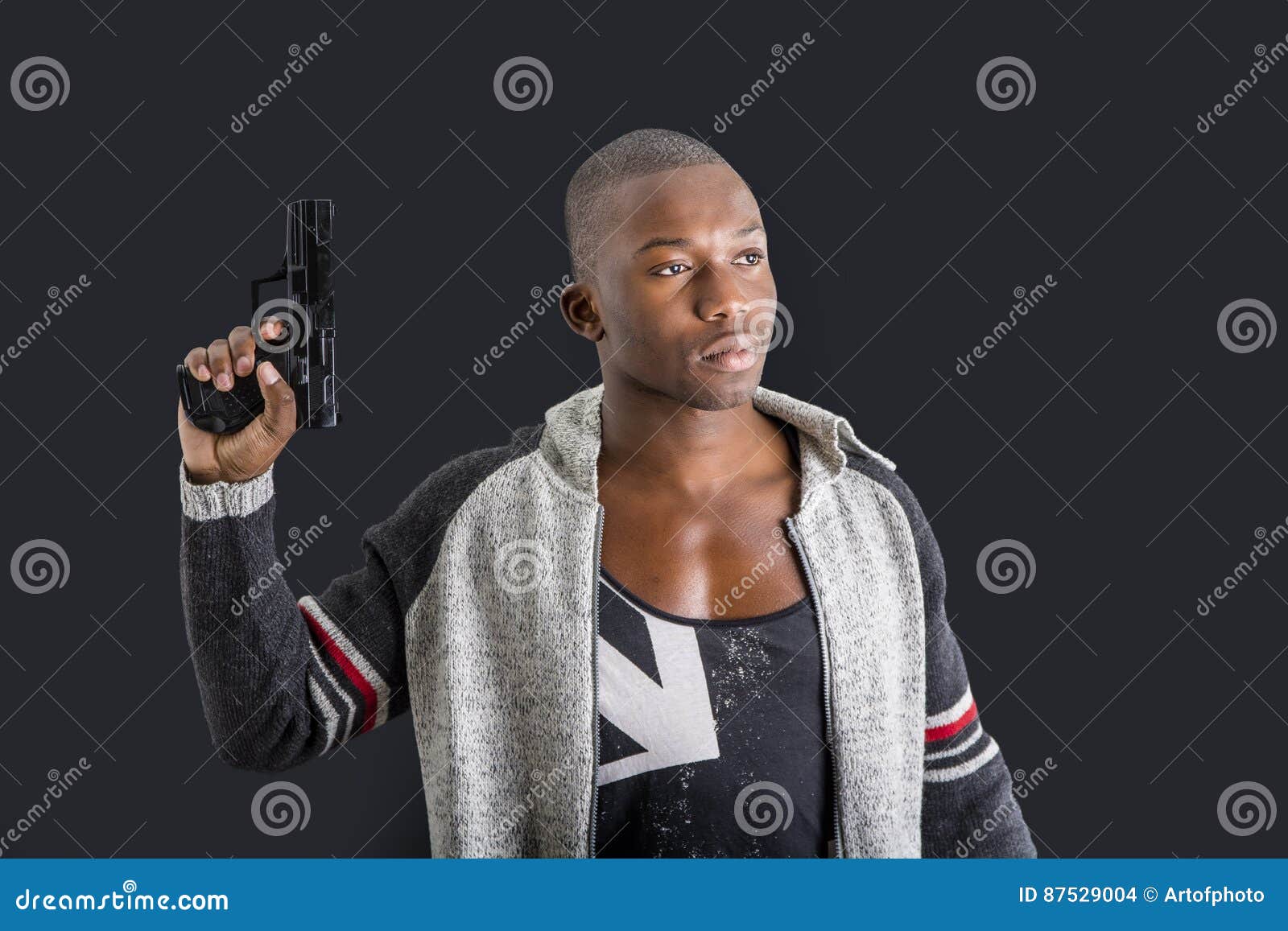 Young Handsome Black Man Holding a Hand Gun Stock Photo - Image of ...