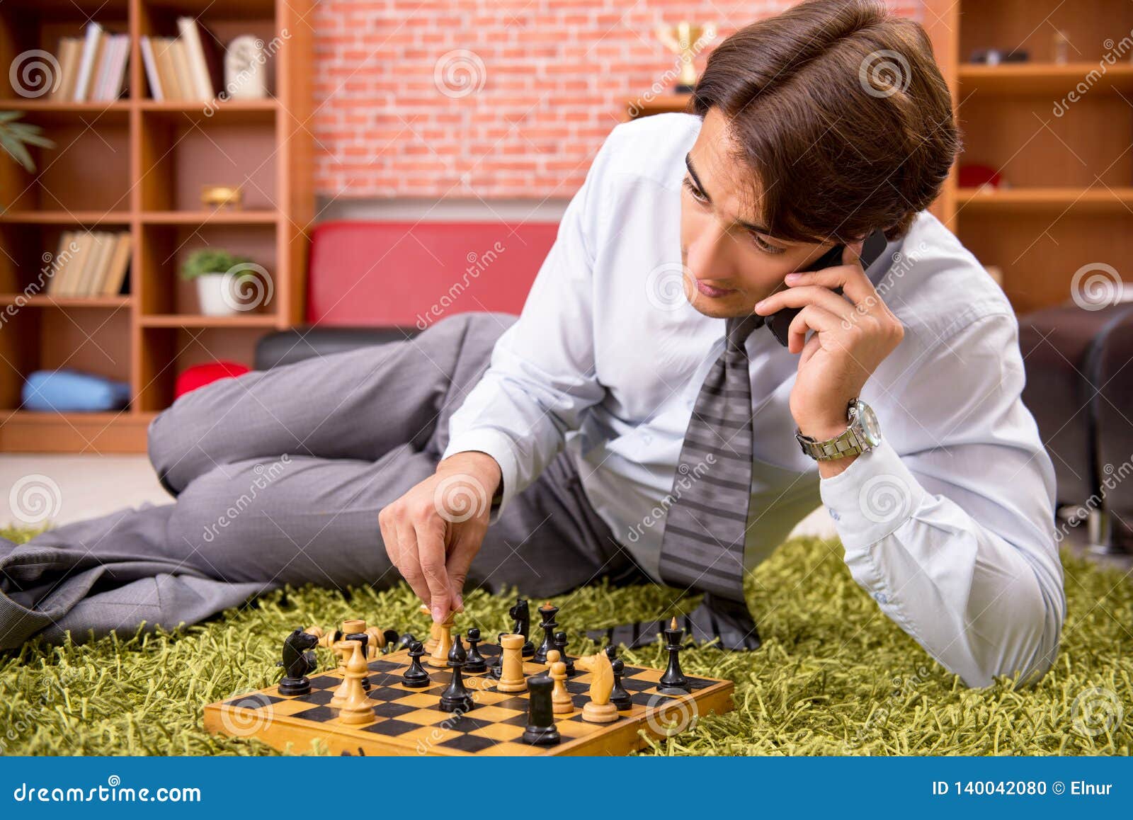 The Young Handsome Boss Playing Chess during Break Stock Photo - Image ...