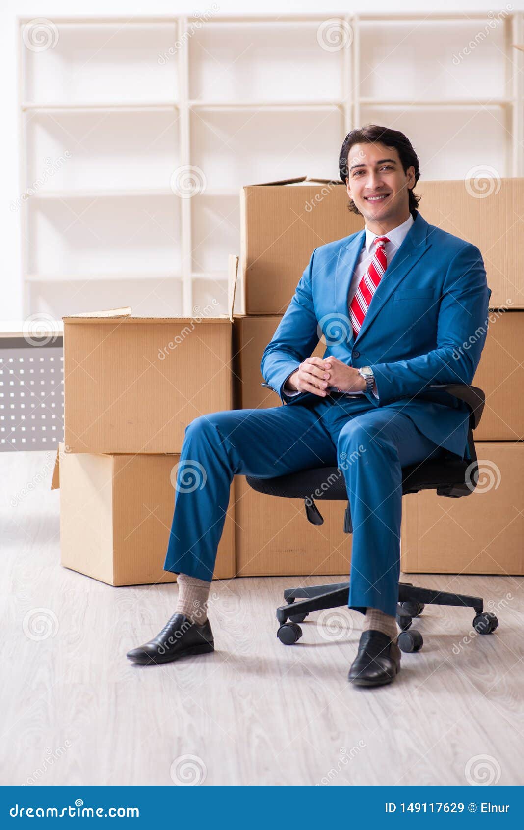 The Young Handsome Businessman Moving To New Workplace Stock Image ...