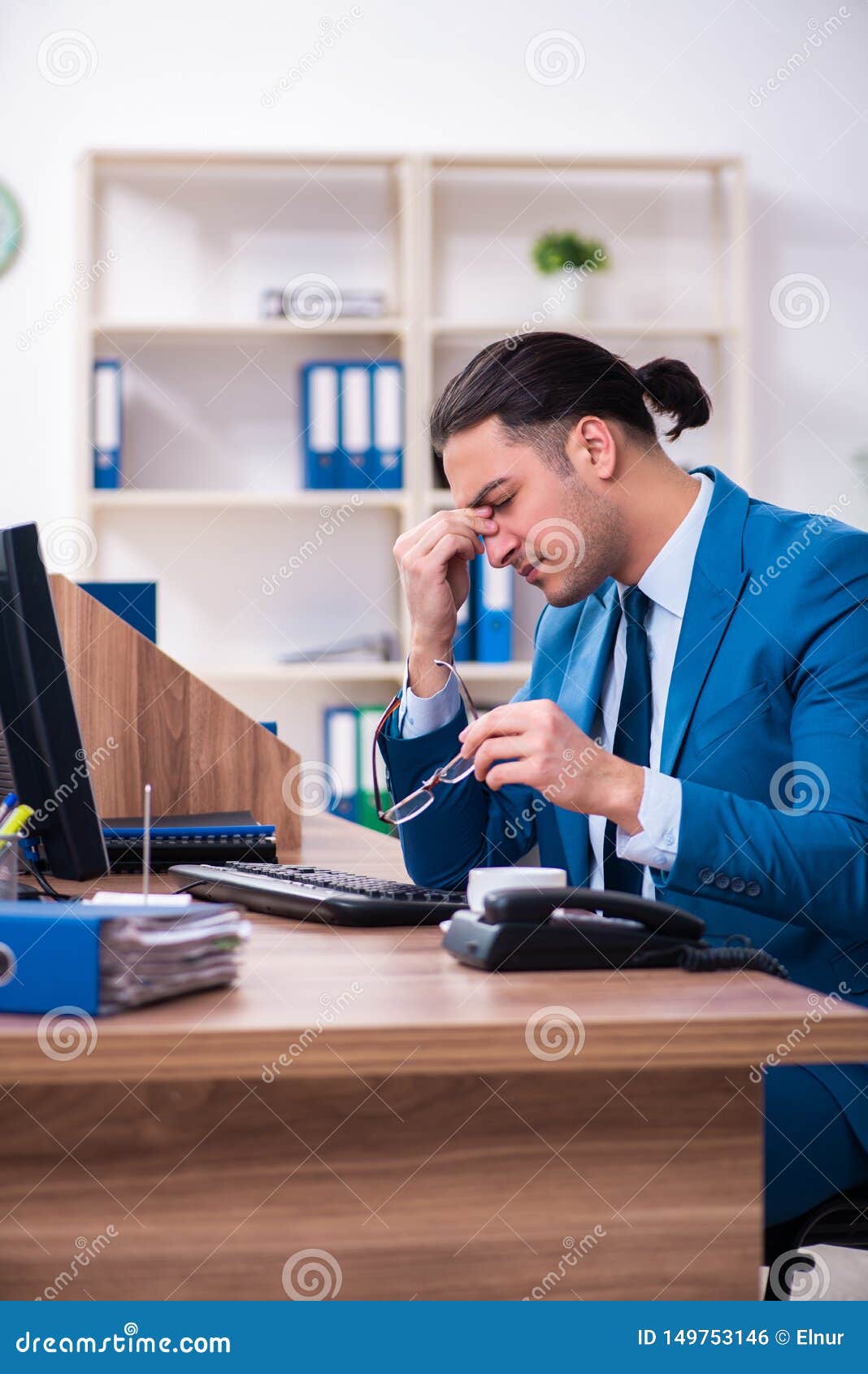Young Handsome Businessman Sitting in the Office Stock Photo - Image of ...