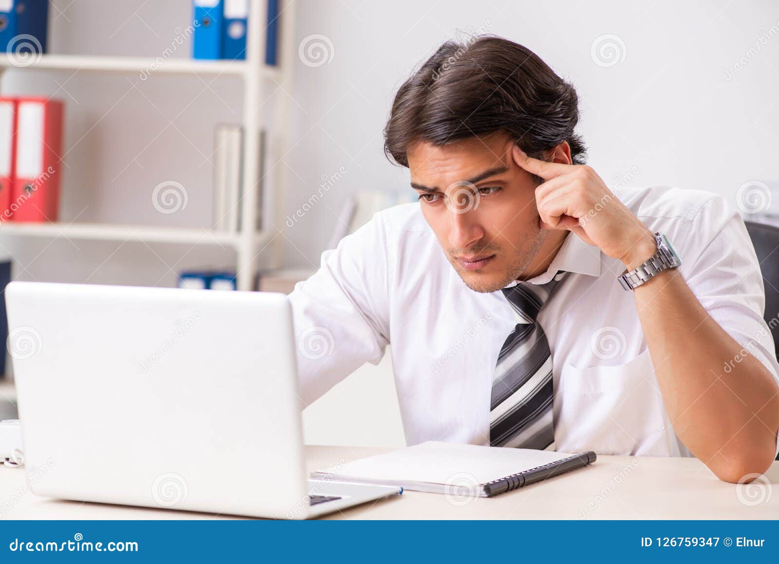 The Young Handsome Businessman Working in Office Stock Image - Image of ...