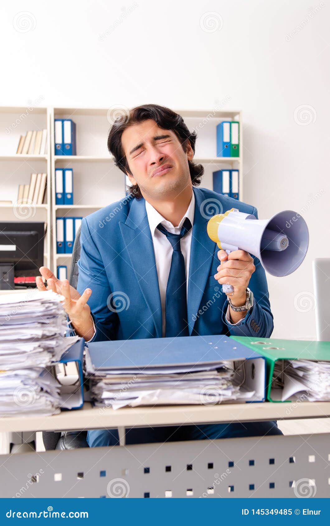 The Young Handsome Busy Employee Sitting in Office Stock Image - Image ...