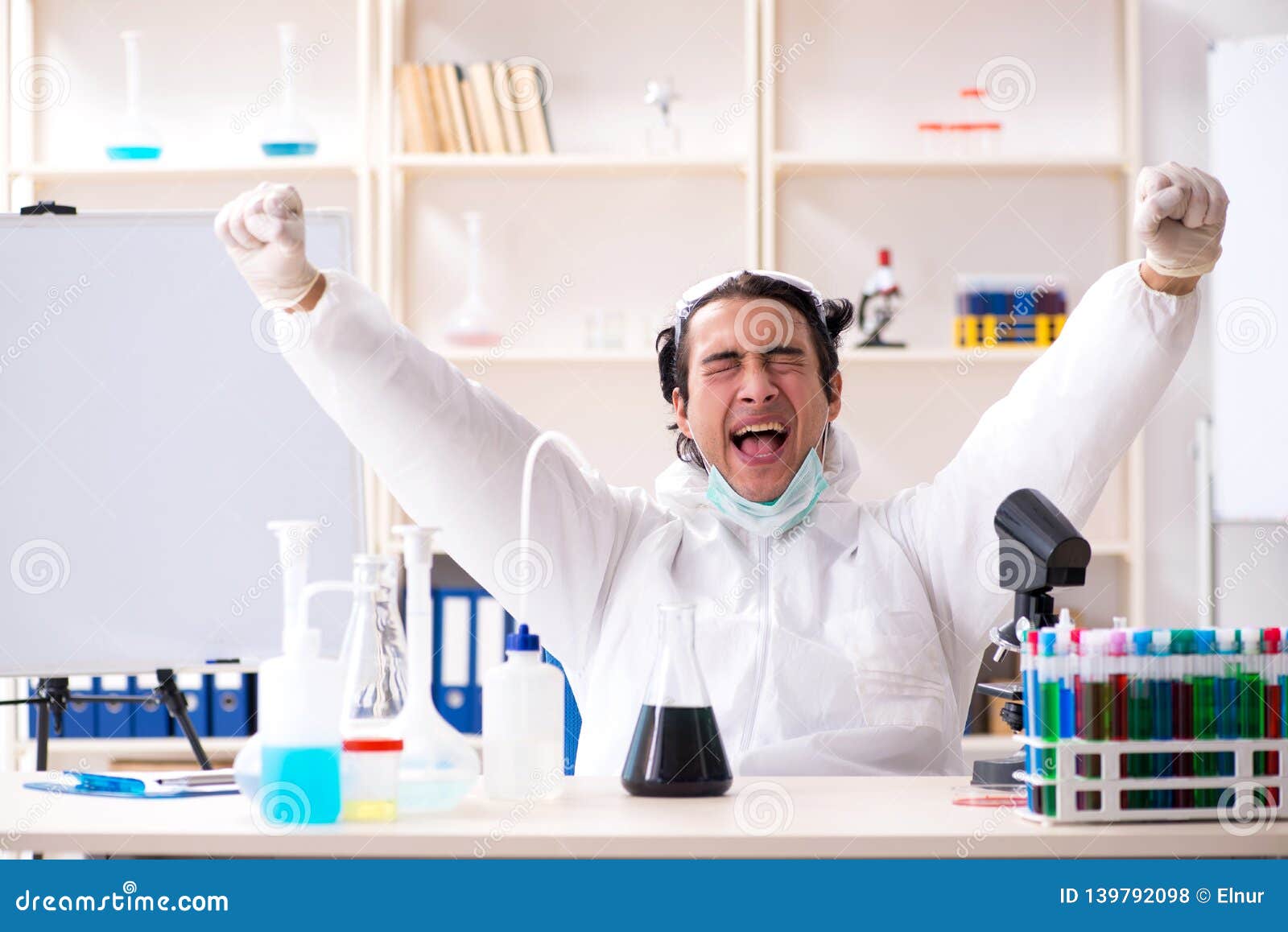 The Young Handsome Chemist Working in the Lab Stock Photo - Image of ...