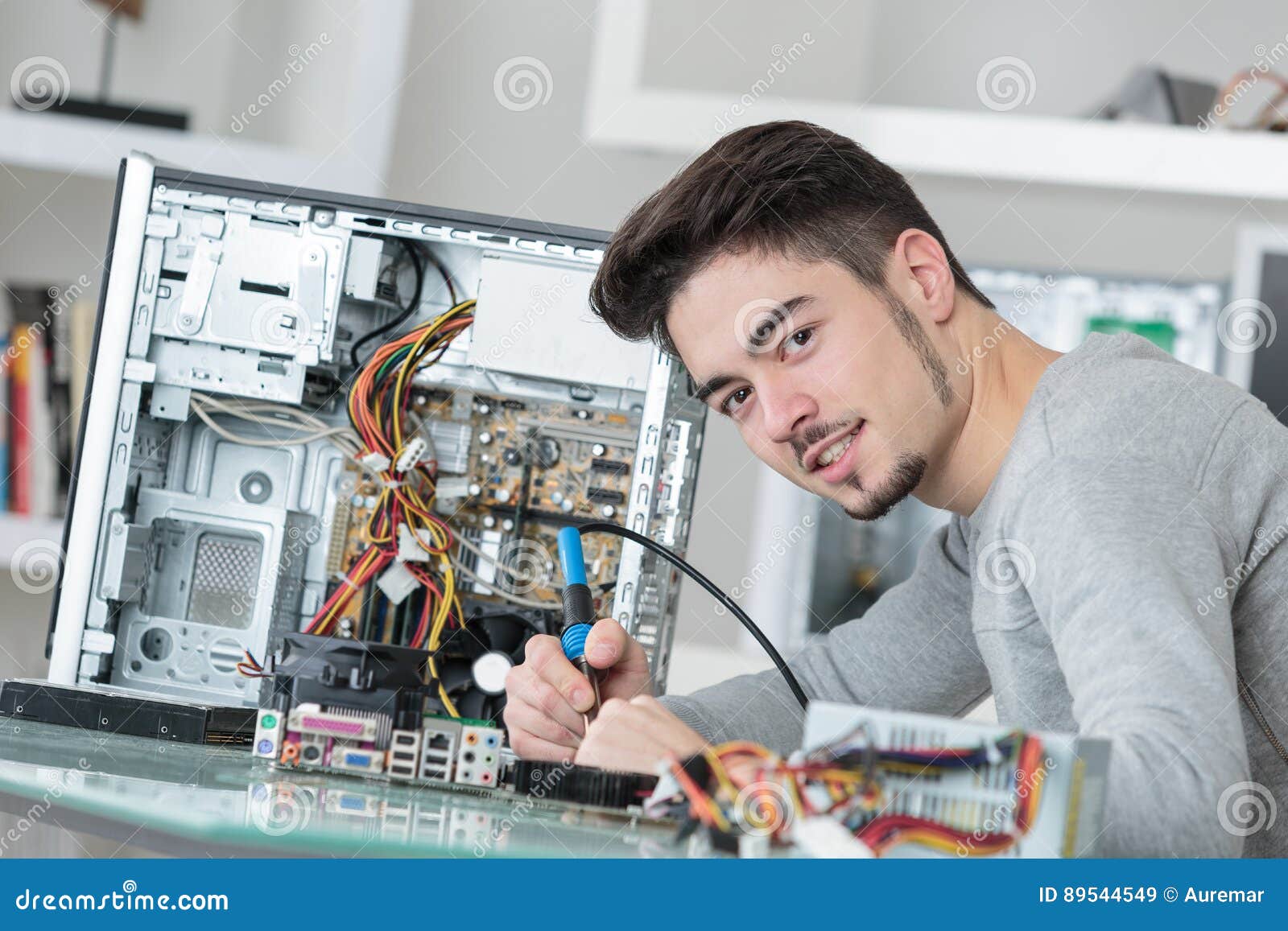 Young Handsome Computer Repairer Concentrated on Work Stock Image ...