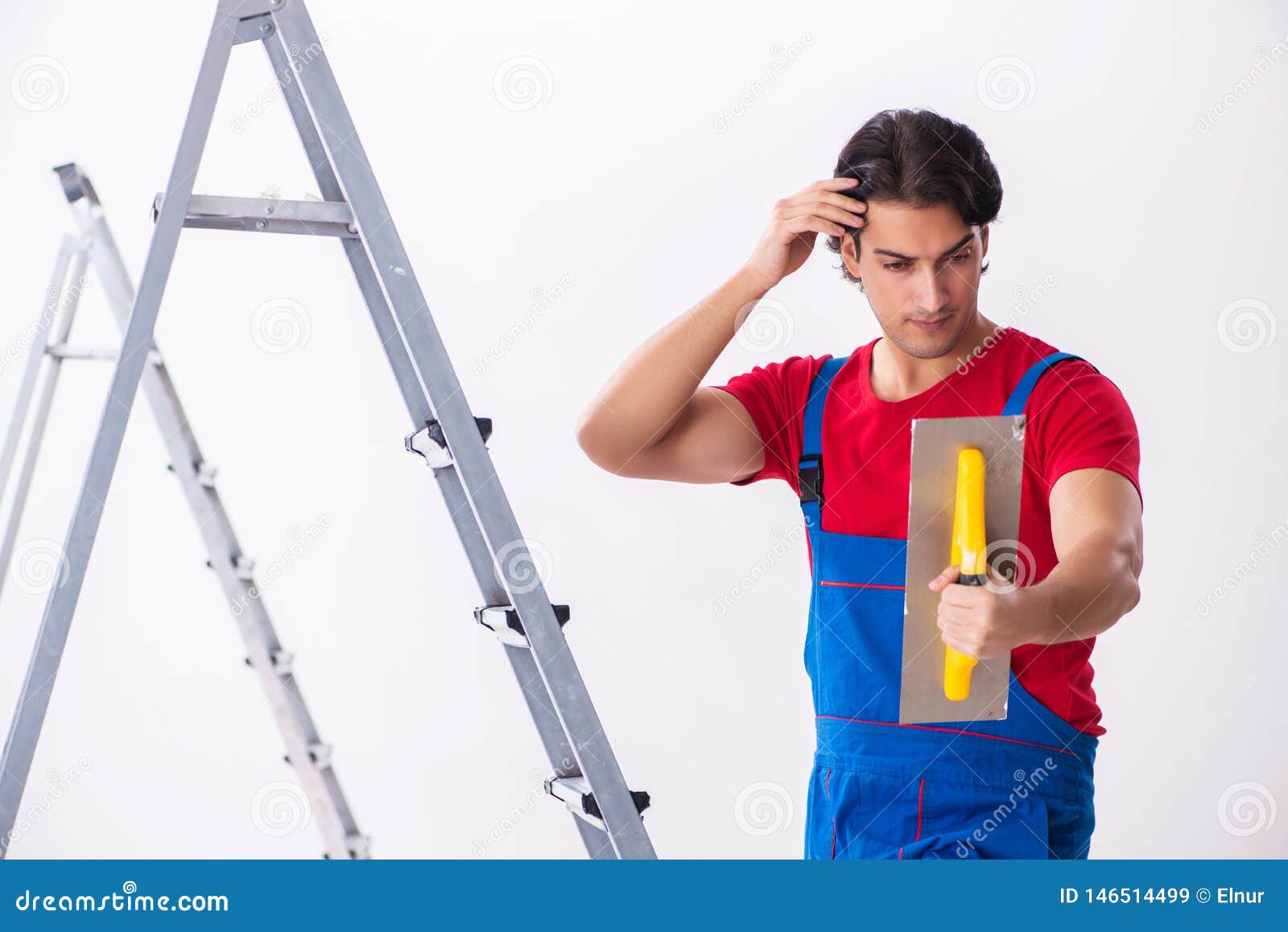 The Young Handsome Contractor Working Indoors Stock Image - Image of ...