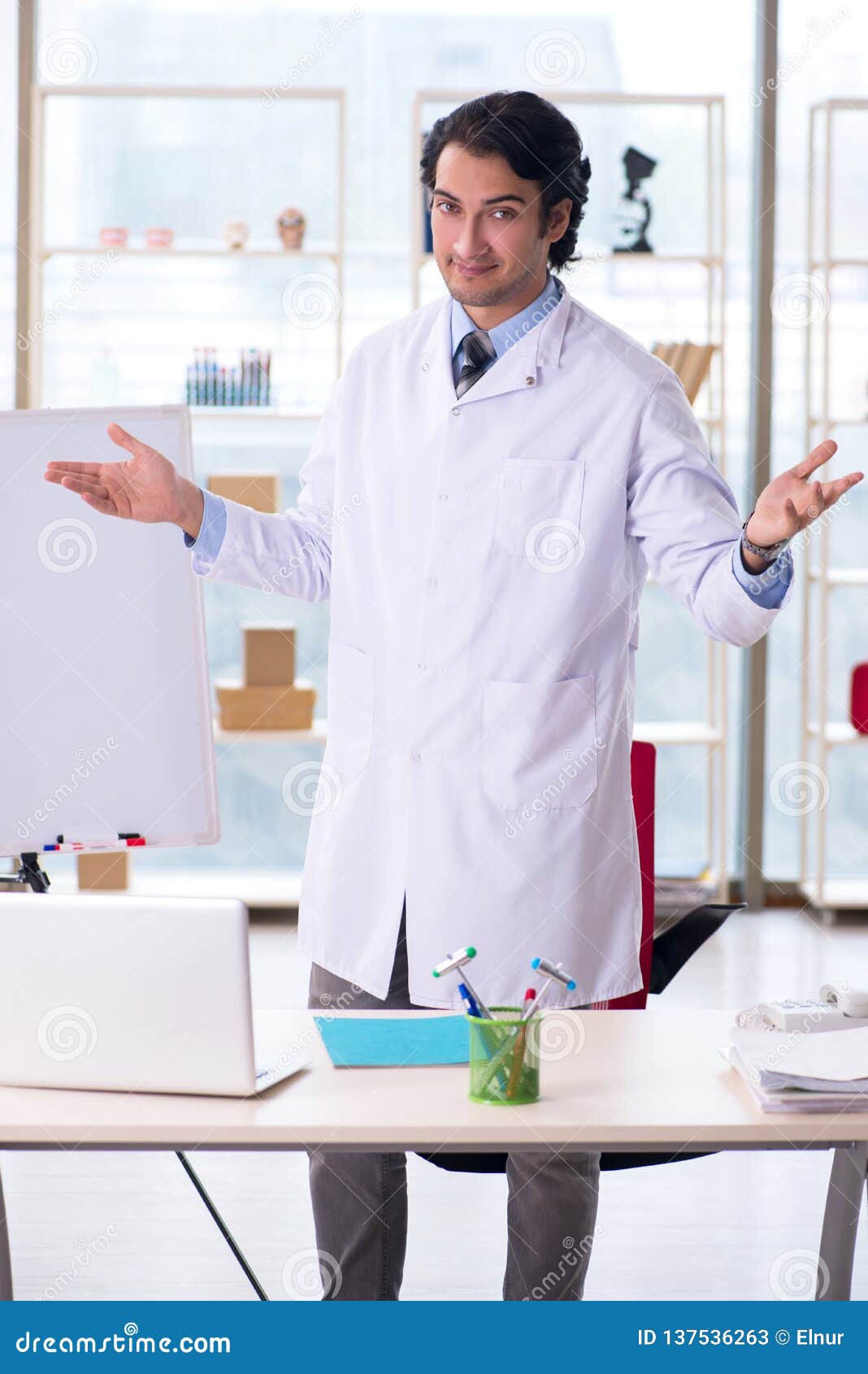 The Young Handsome Doctor in Front of Whiteboard Stock Image - Image of ...