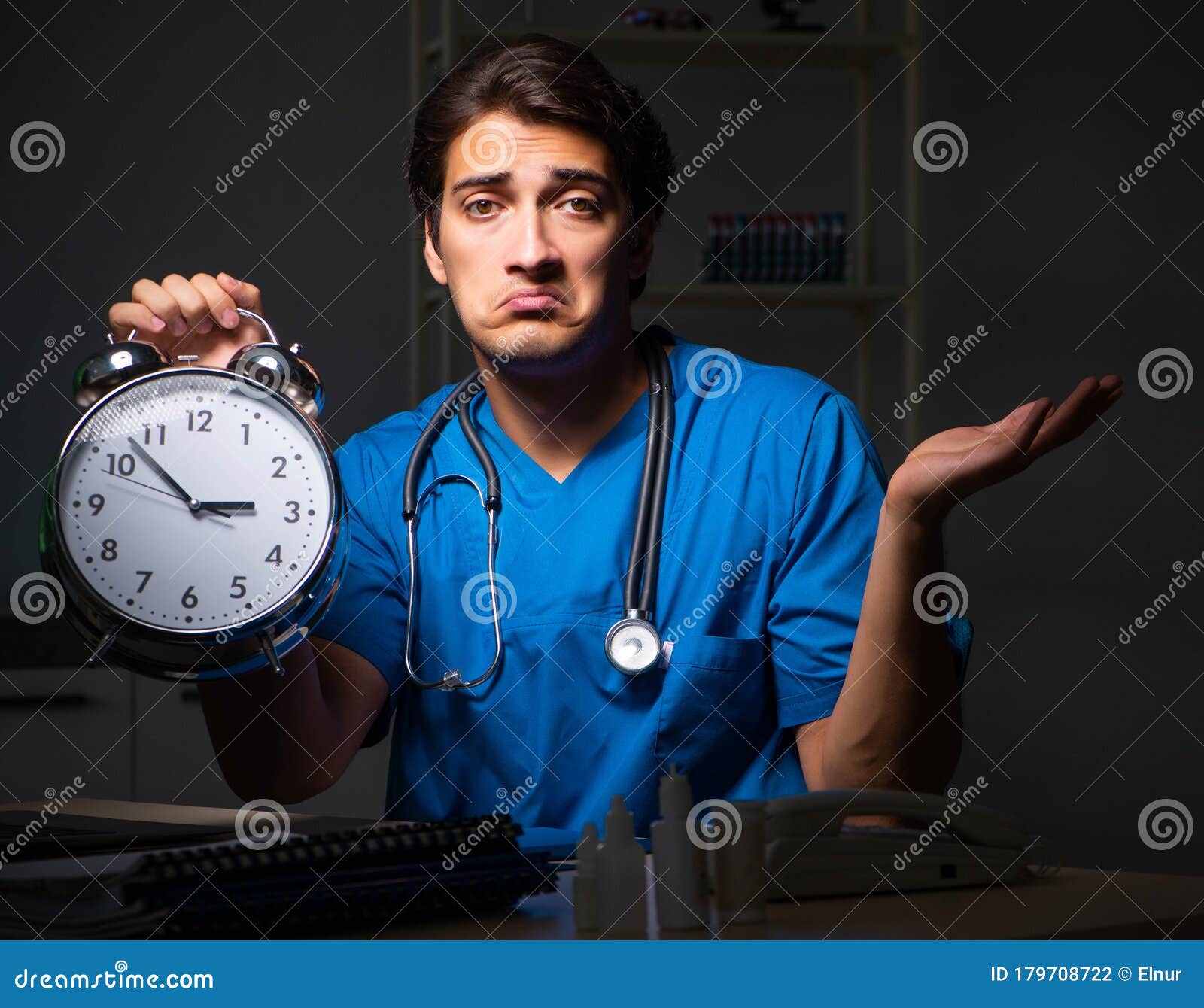 Young Handsome Doctor Working Night Shift in Hospital Stock Photo ...