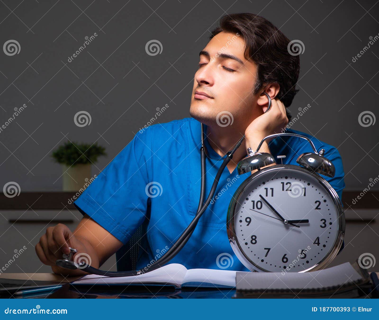 Young Handsome Doctor Working Night Shift in Hospital Stock Image ...