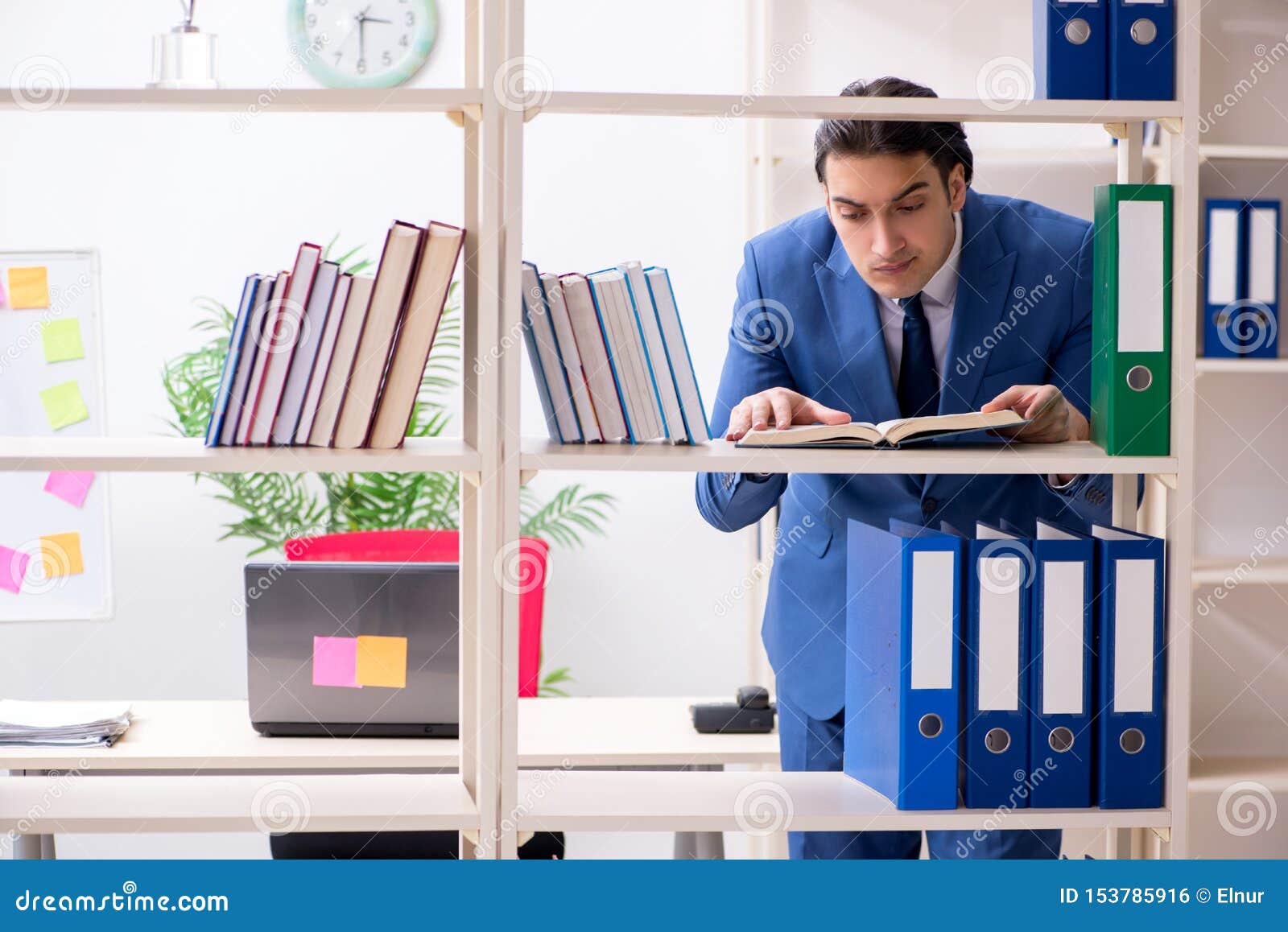 Young Handsome Employee in the Office Stock Photo - Image of laptop ...