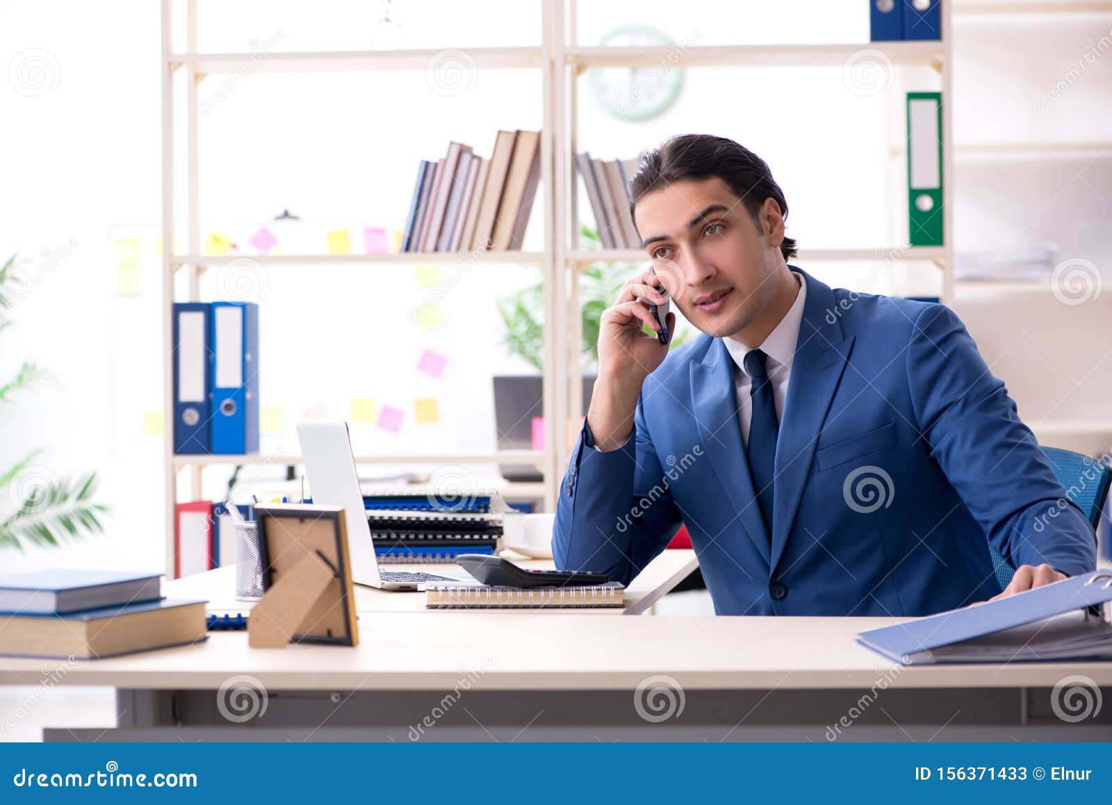 Young Handsome Employee in the Office Stock Image - Image of intern ...