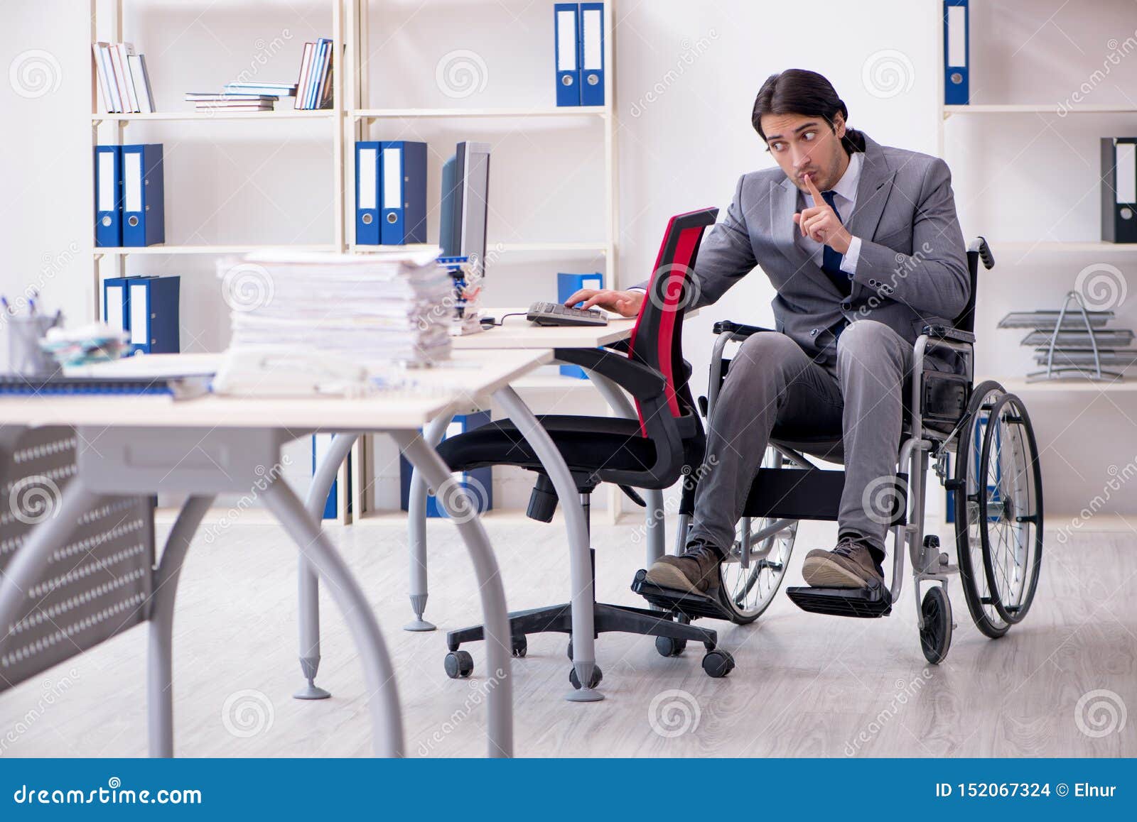 Young Handsome Employee in Wheelchair Working in the Office Stock Photo ...