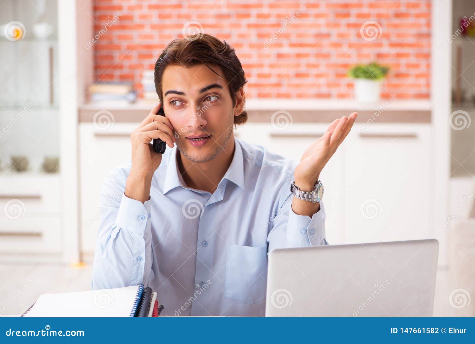 The Young Handsome Employee Working in the Office Stock Photo - Image ...