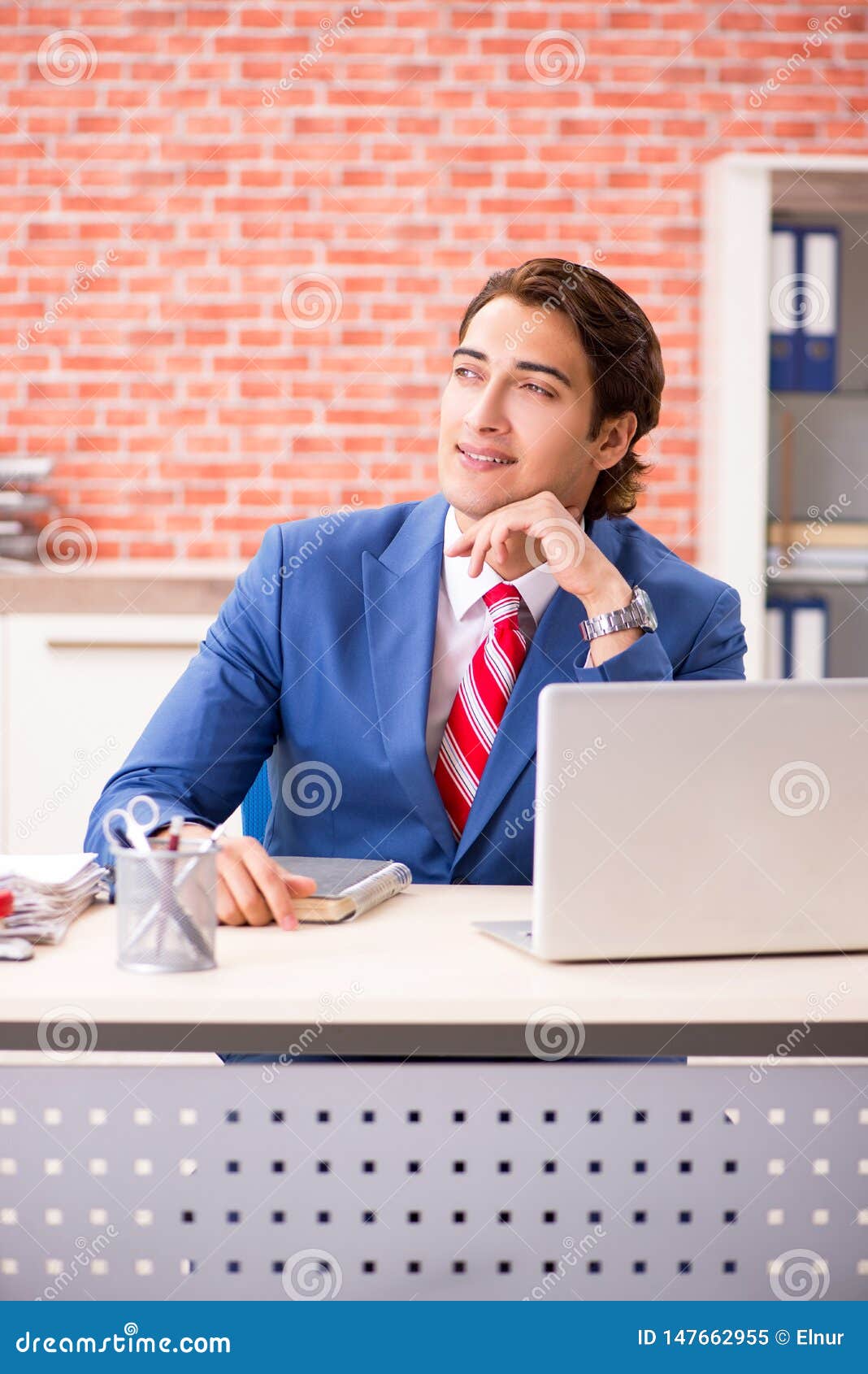 The Young Handsome Employee Working in the Office Stock Image - Image ...