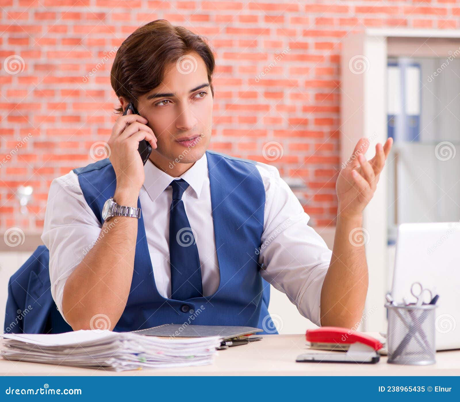 The Young Handsome Employee Working in the Office Stock Image - Image ...
