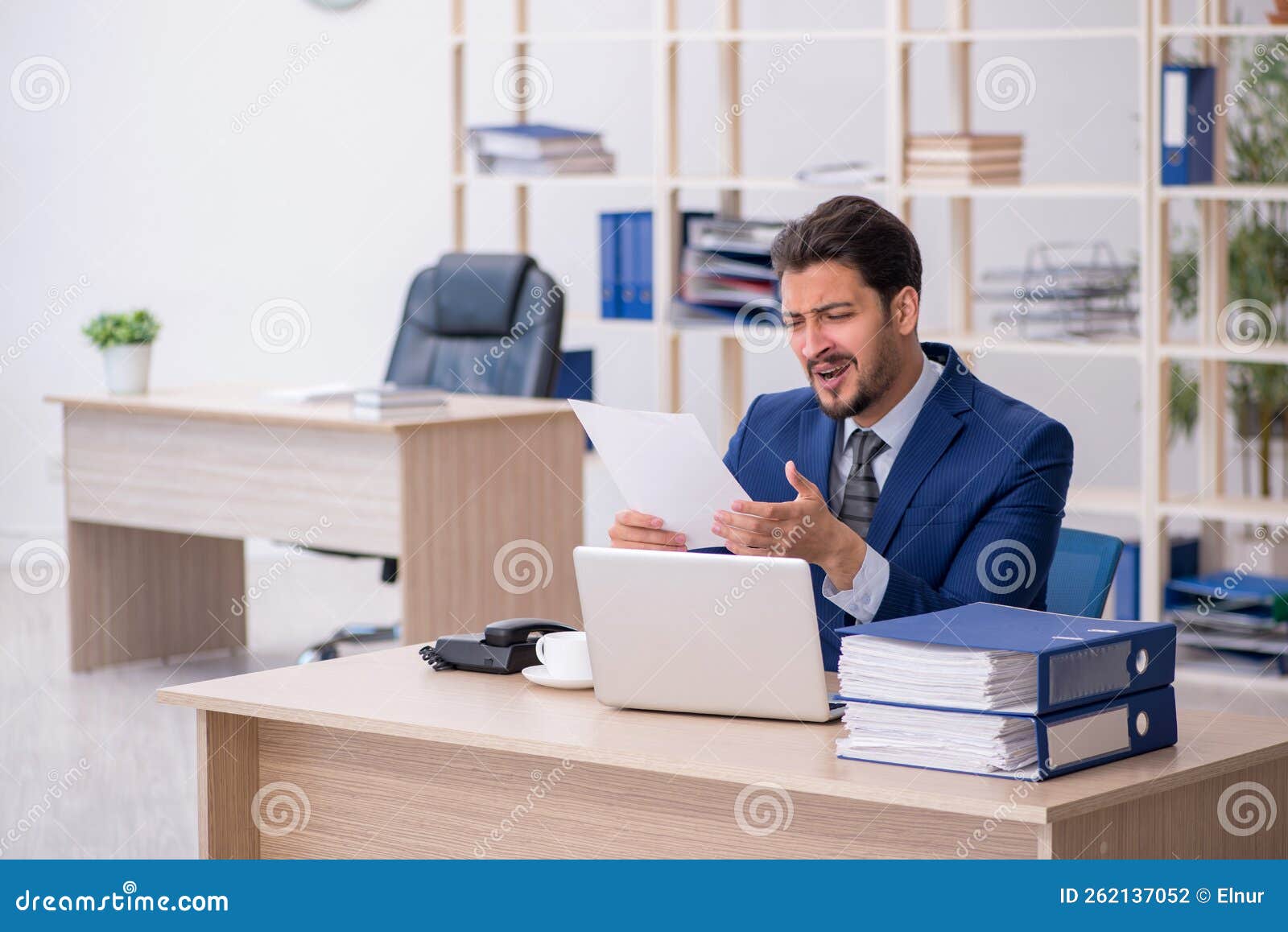 Young Handsome Employee Working in the Office Stock Photo - Image of ...