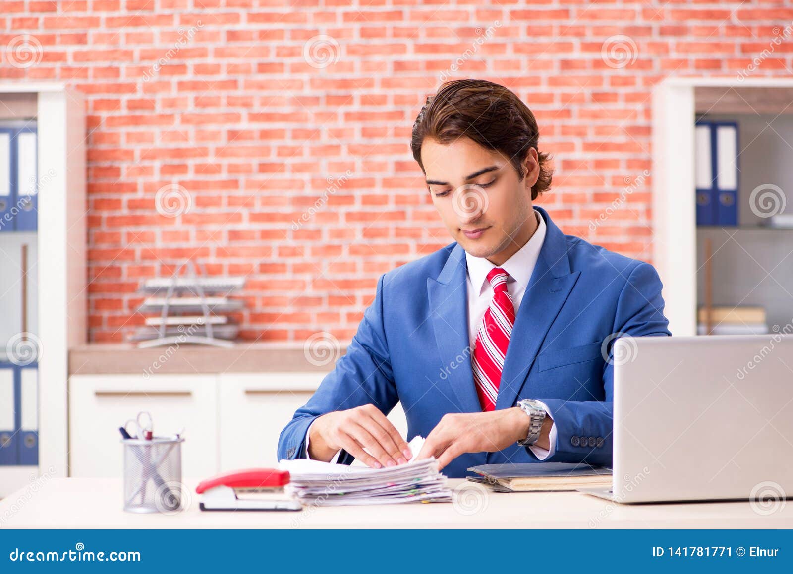 The Young Handsome Employee Working in the Office Stock Image - Image ...