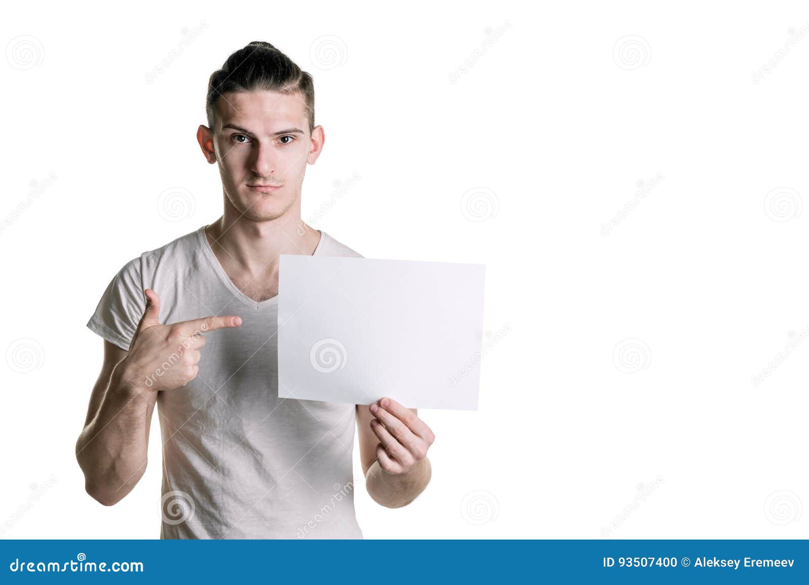 Young Handsome Guy with a Blank Sheet of Paper Looking into the Frame ...