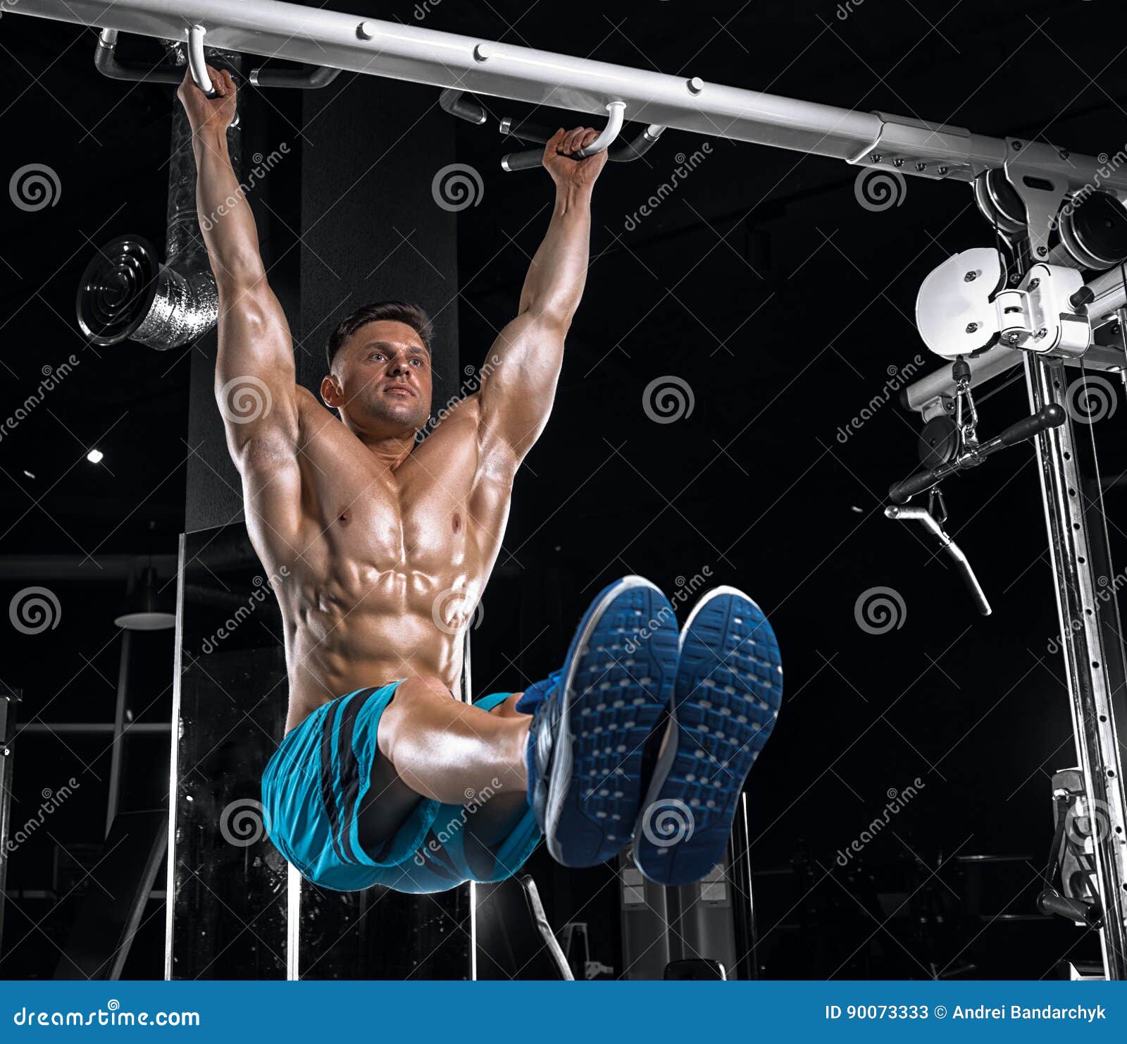 Young Handsome Guy Doing Exercises in the Gym Stock Image - Image of ...