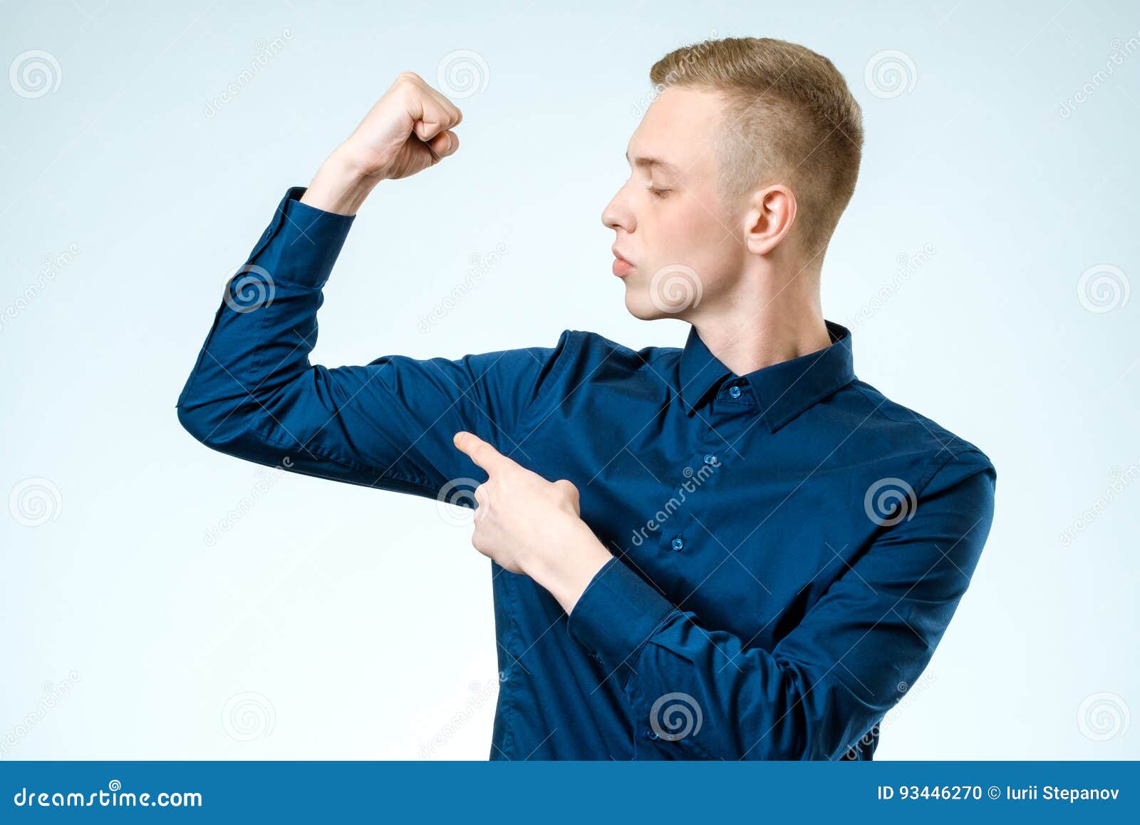 Young Handsome Guy Pointing at His Biceps Stock Photo - Image of ...