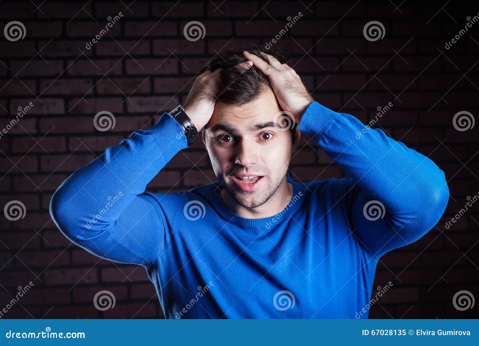 Young handsome guy scared stock image. Image of surprise - 67028135