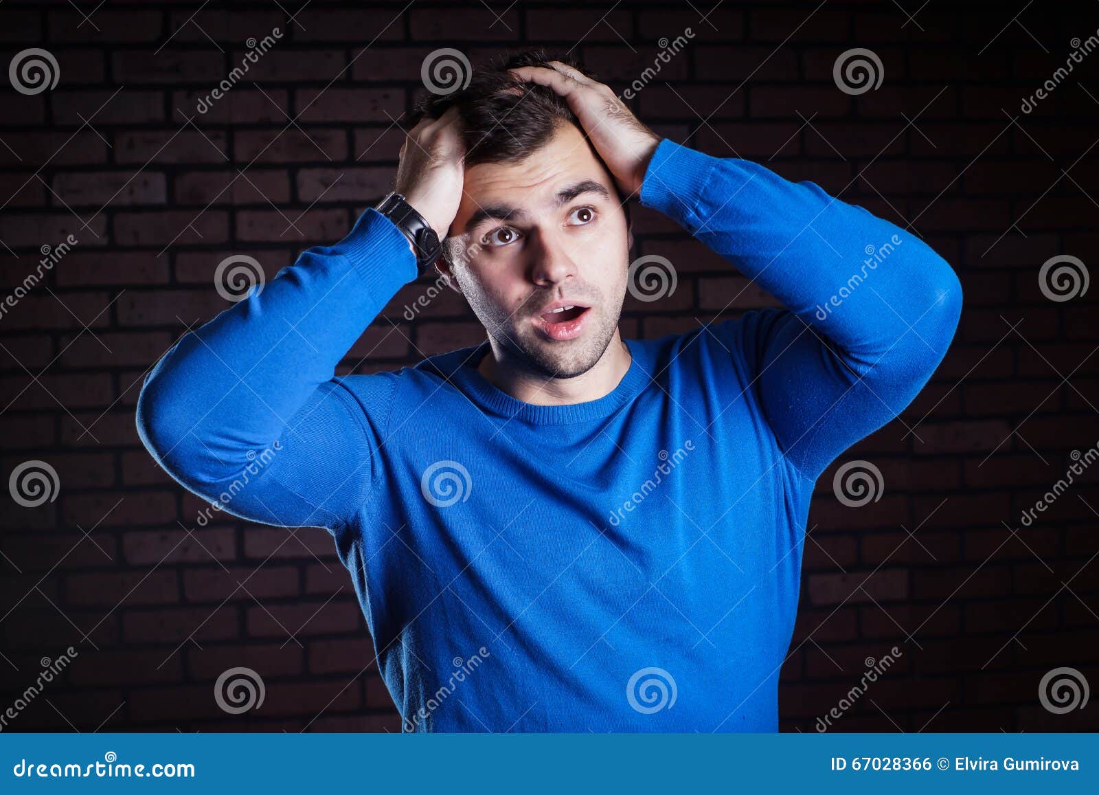 Young handsome guy scared stock photo. Image of oriented - 67028366
