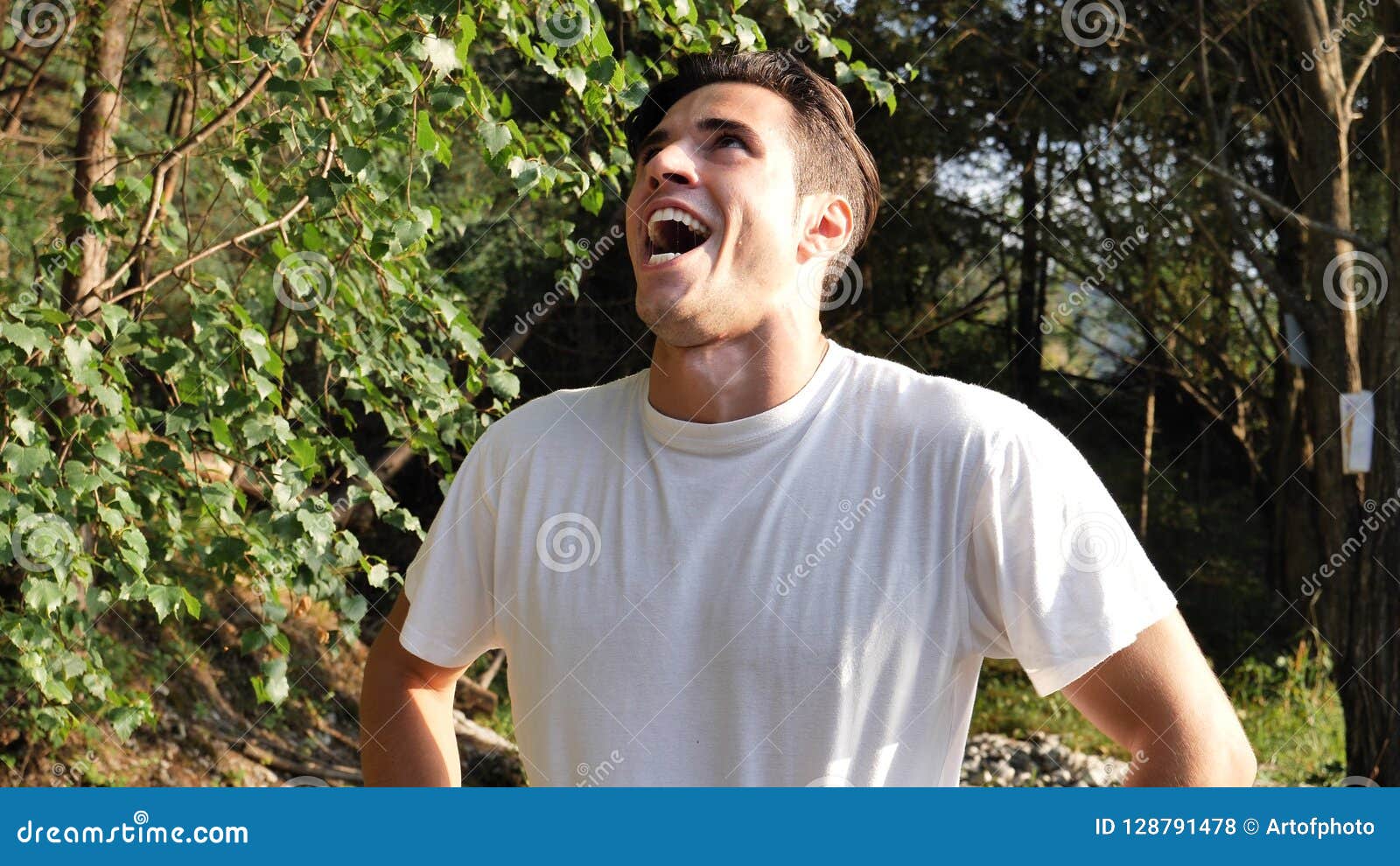 Young Man Doing Evil Laughter, Outside in Nature Stock Photo - Image of ...