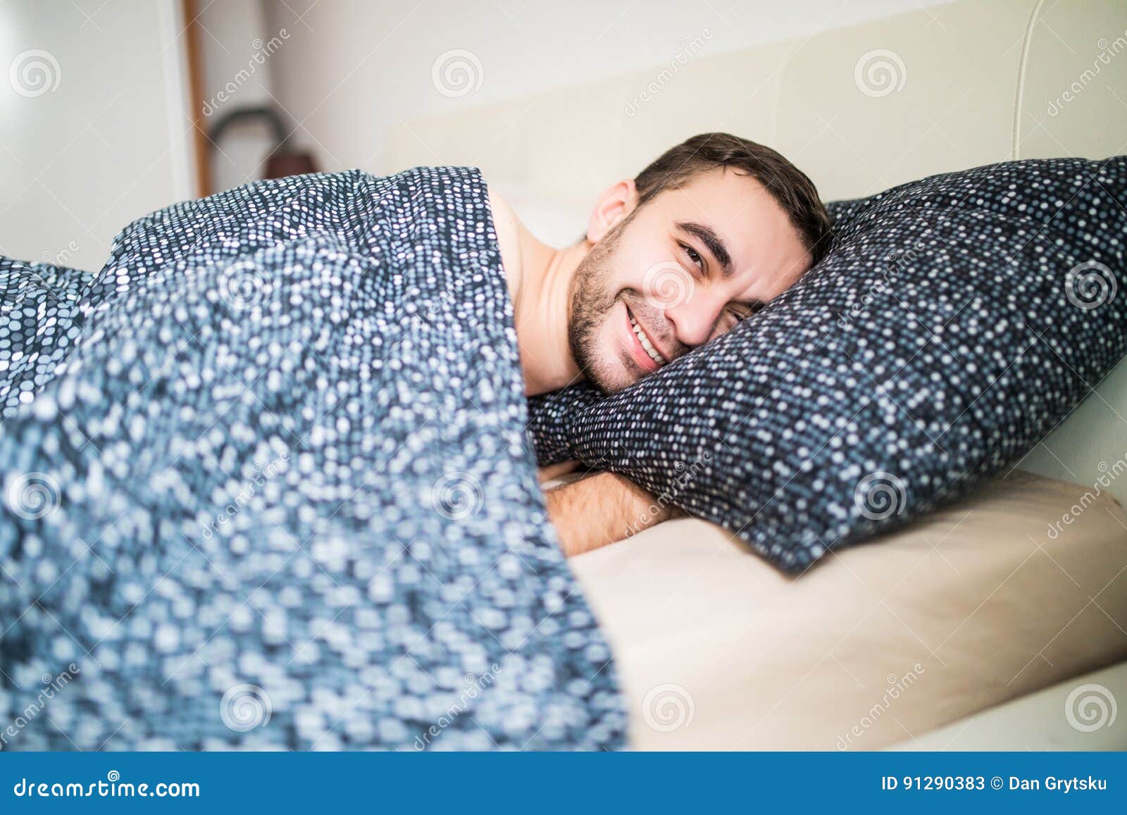 Young Handsome Happy Man Waking Up on Bed at Home Stock Image - Image ...