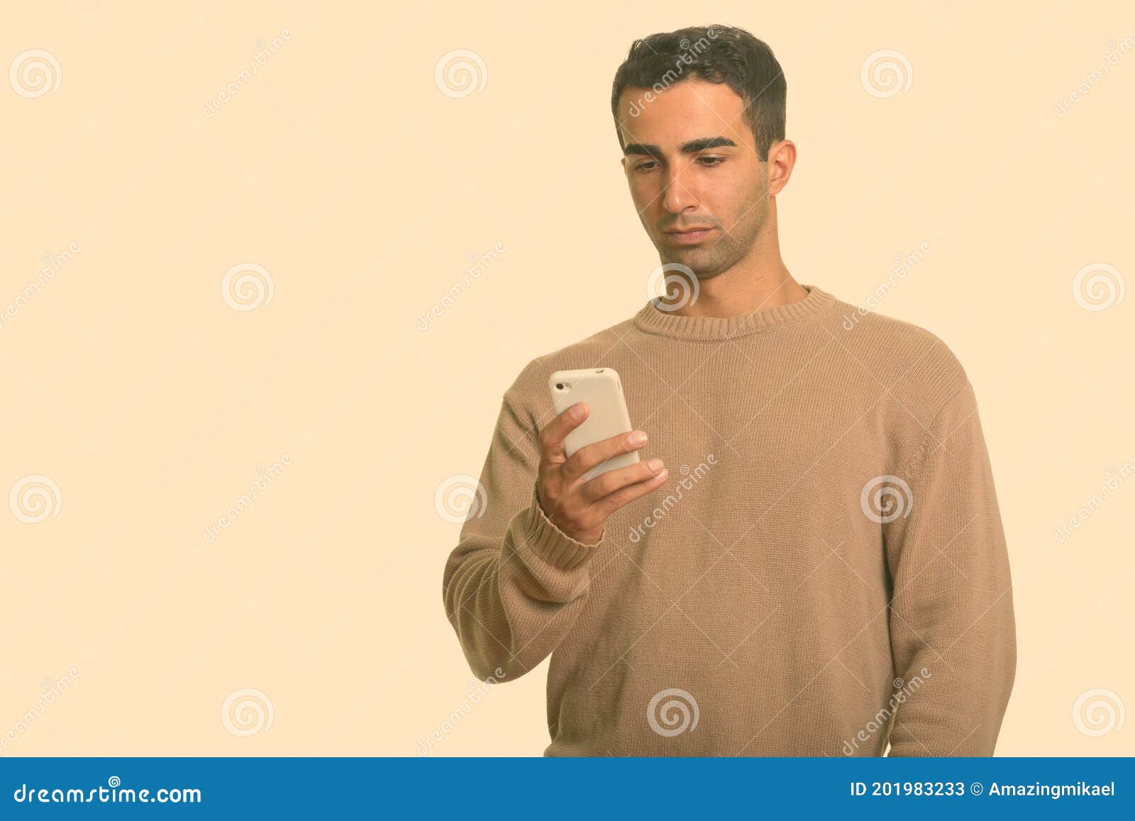 Young Handsome Iranian Man Using Mobile Phone Stock Image - Image of ...