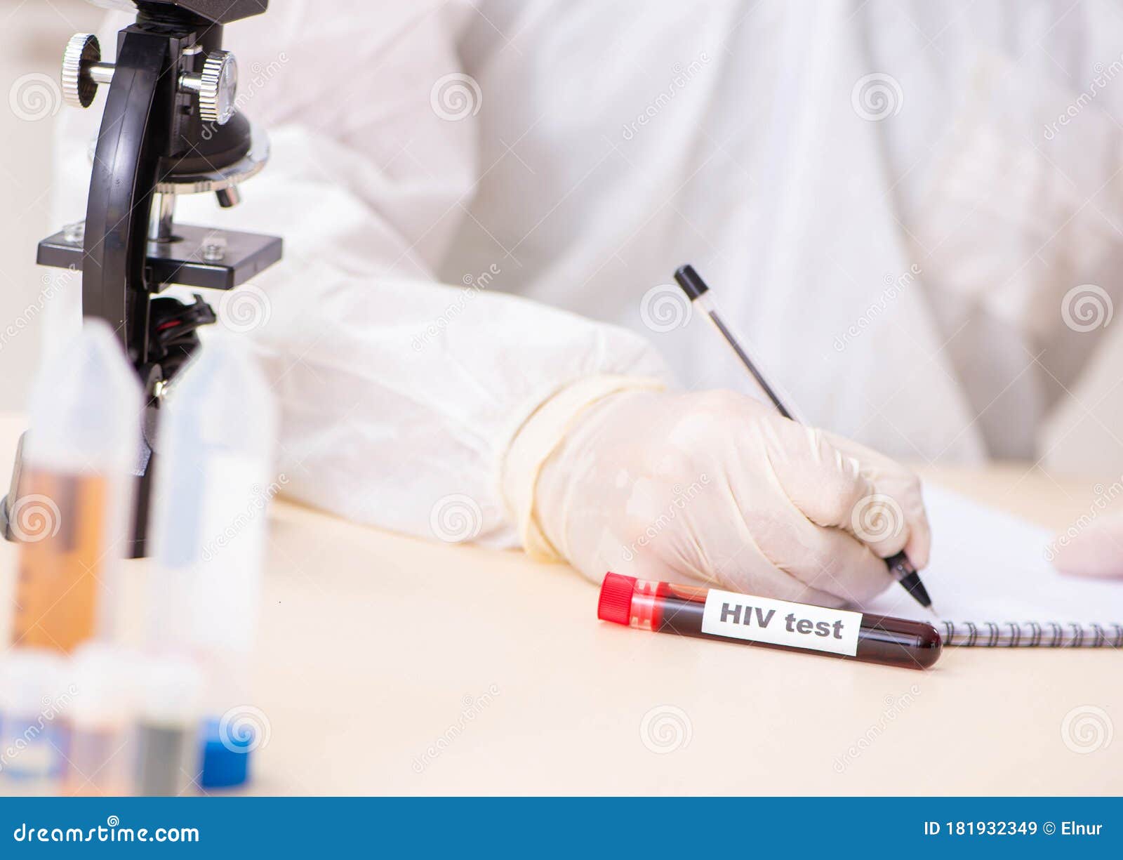 Young Handsome Lab Assistant Testing Blood Samples in Hospital Stock ...