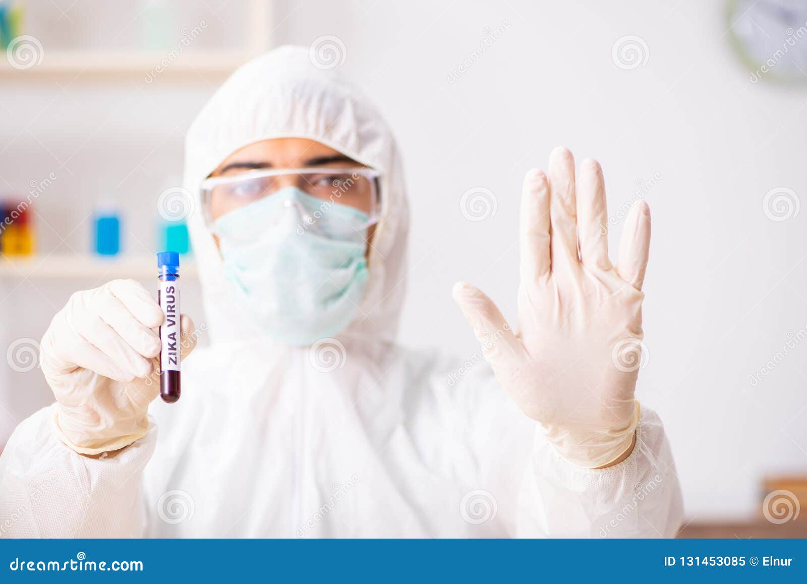 The Young Handsome Lab Assistant Testing Blood Samples in Hospital ...
