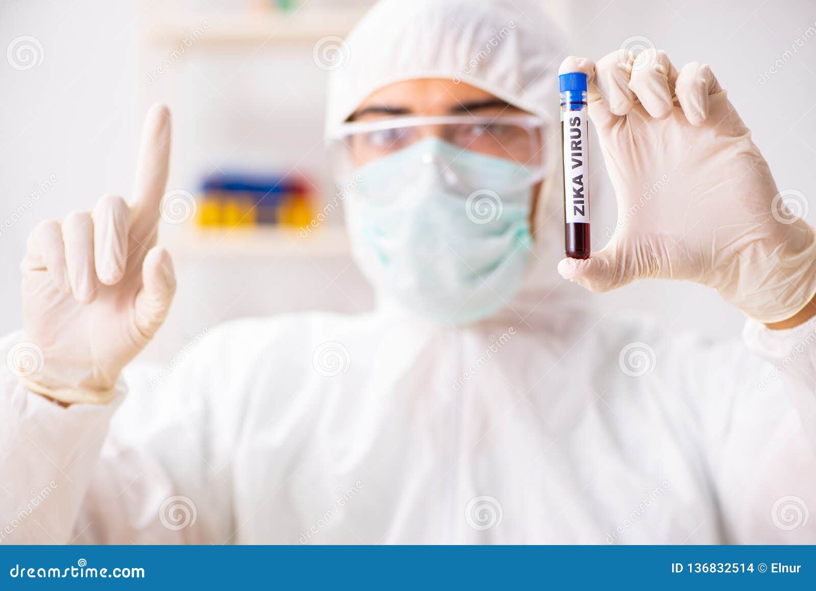 The Young Handsome Lab Assistant Testing Blood Samples in Hospital ...