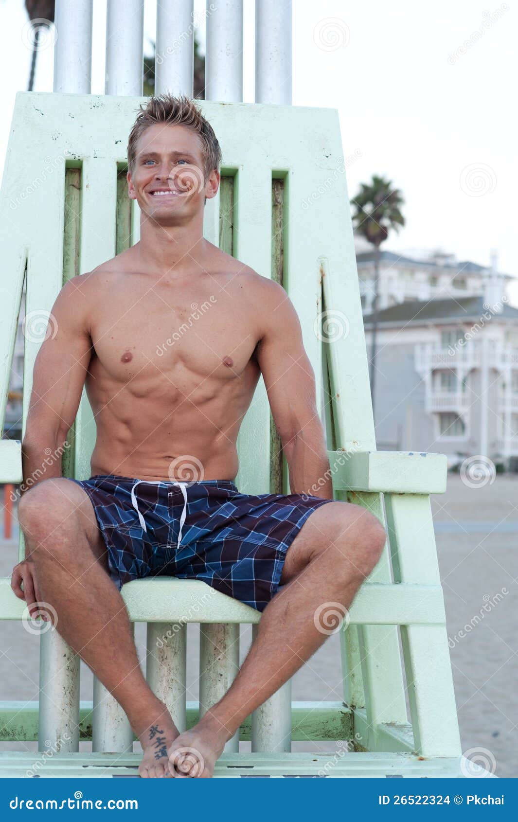 Young handsome lifeguard stock photo. Image of surf, seashore - 26522324