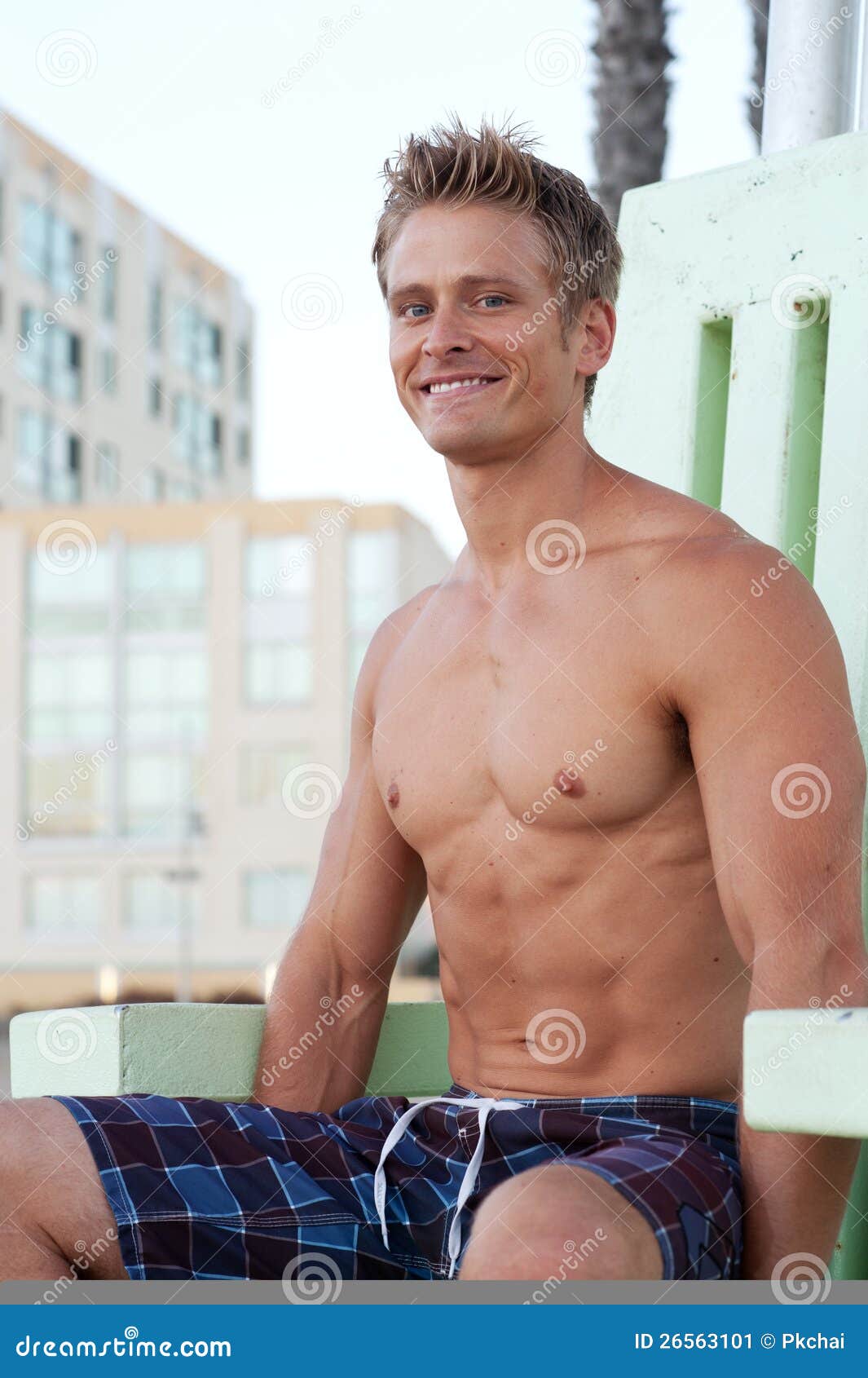 Young handsome lifeguard stock image. Image of sand, fitness - 26563101