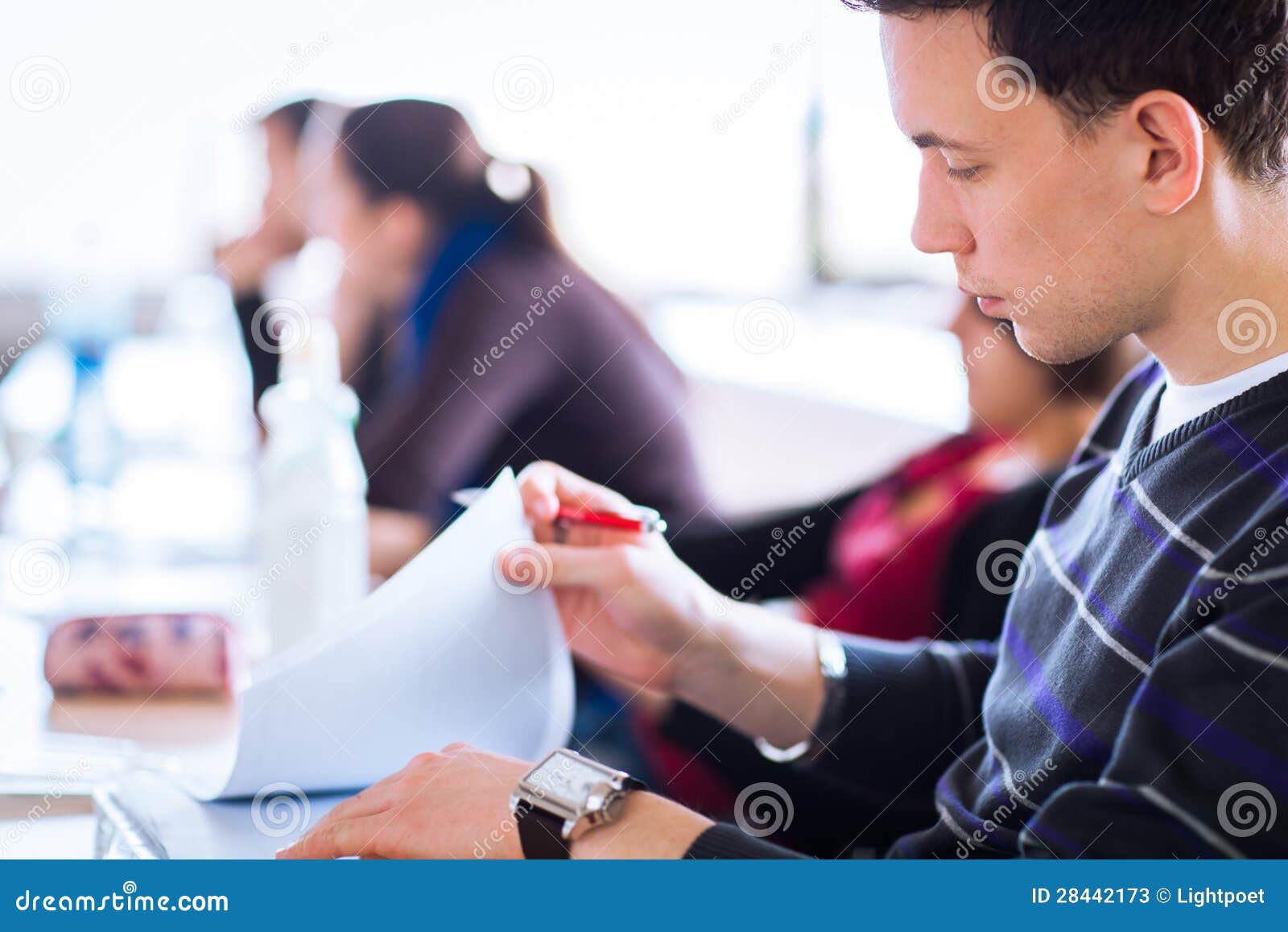 Young, Handsome Male College Student Sitting in a Classroom Full Stock ...