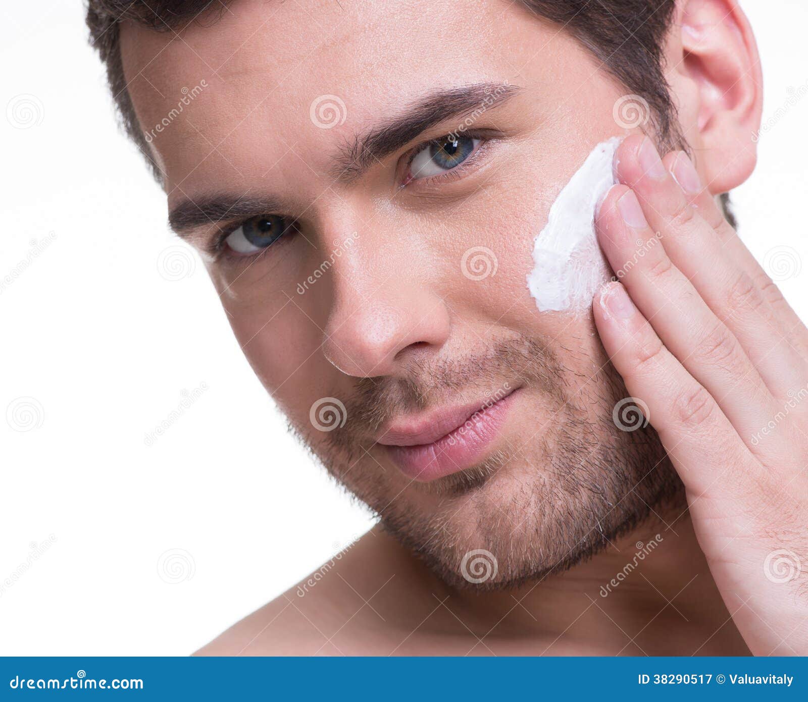Young Handsome Man Applying Cream. Stock Image - Image of morning ...